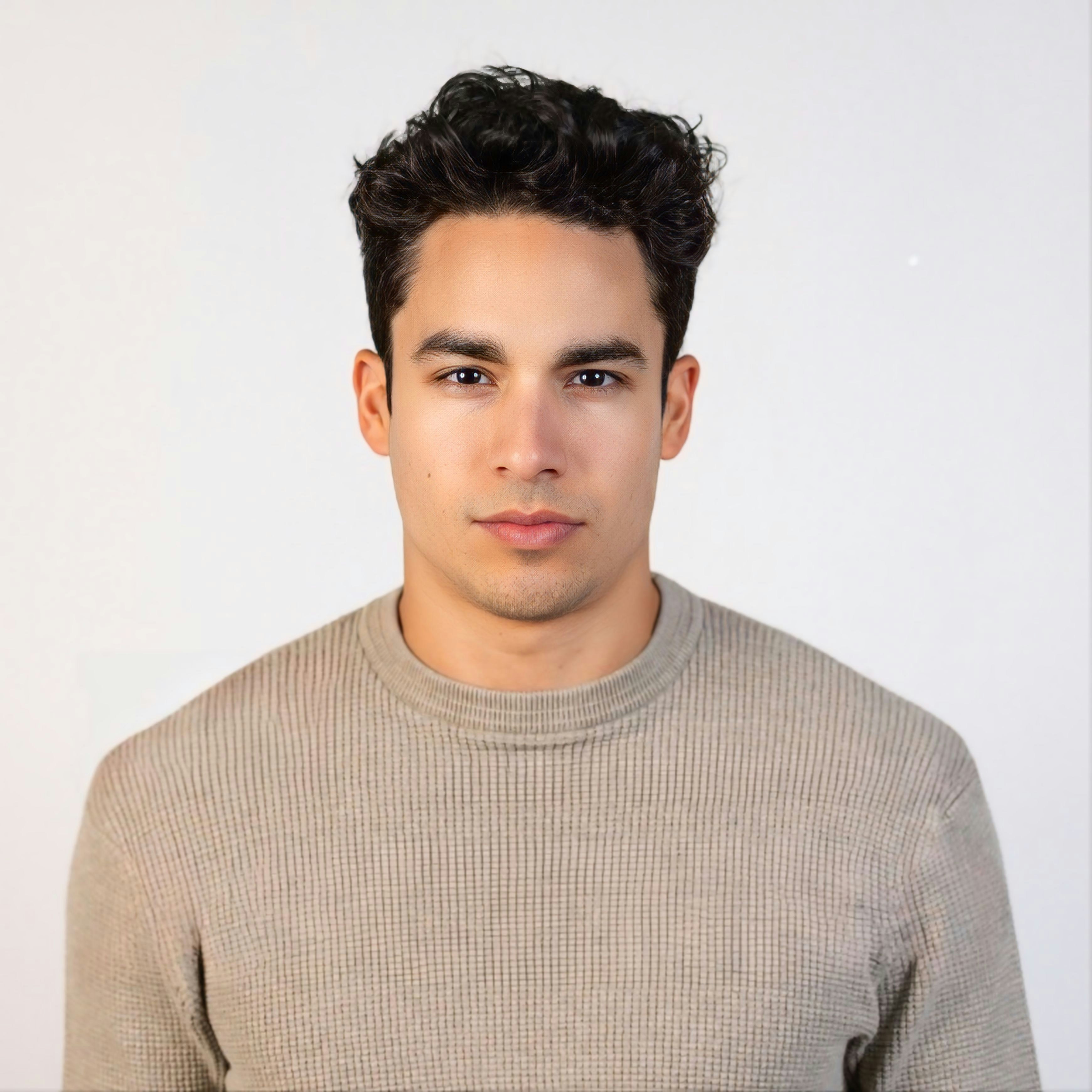 A young man is posing for a photo. photo – Free Man Image on Unsplash