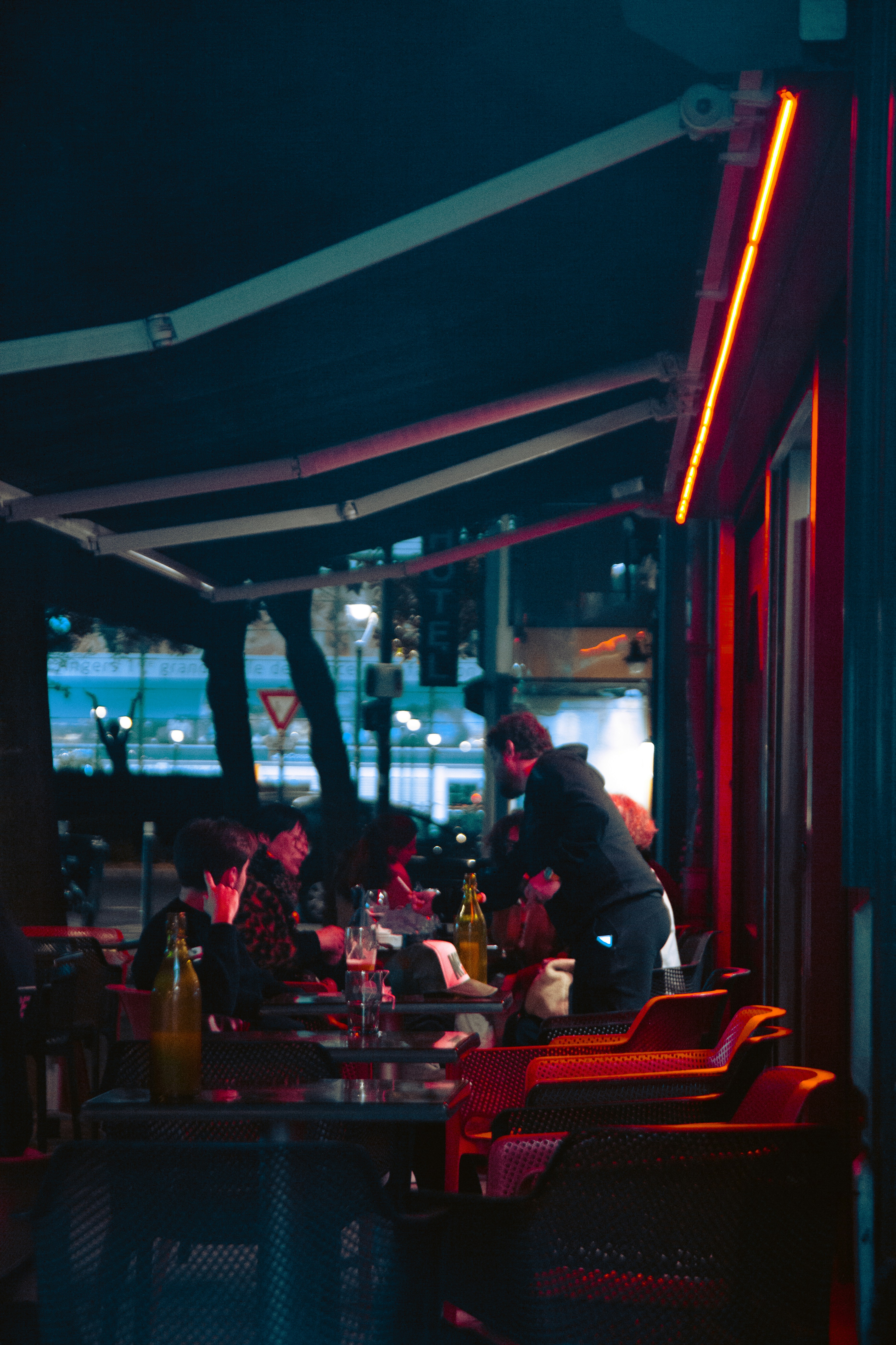 People dine at a restaurant's outdoor section. photo – Free Man Image ...