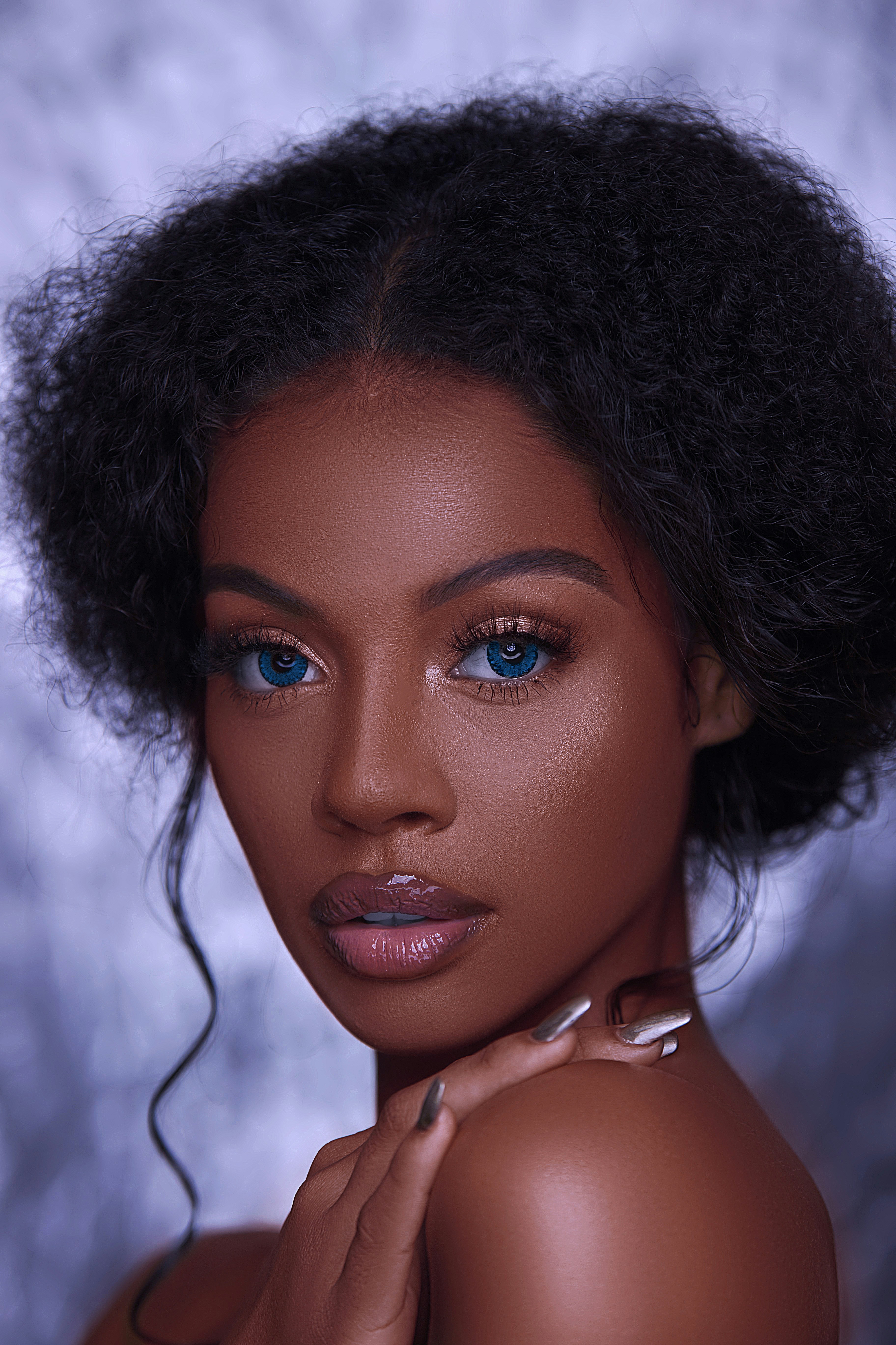 Beautiful woman poses with striking blue eyes. photo – Free Portrait ...