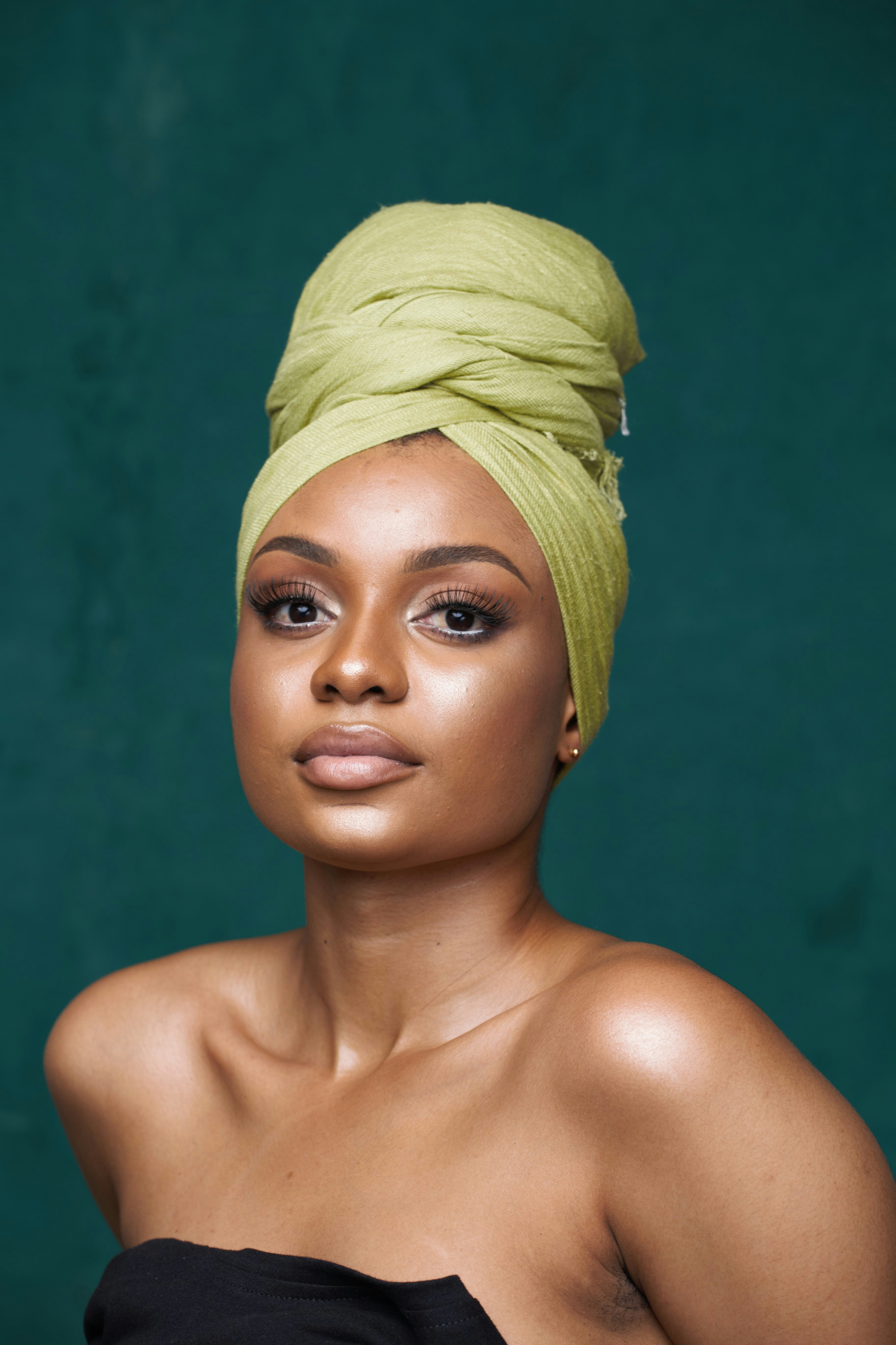 Beautiful woman with head wrap poses for the camera. photo – Free Woman ...