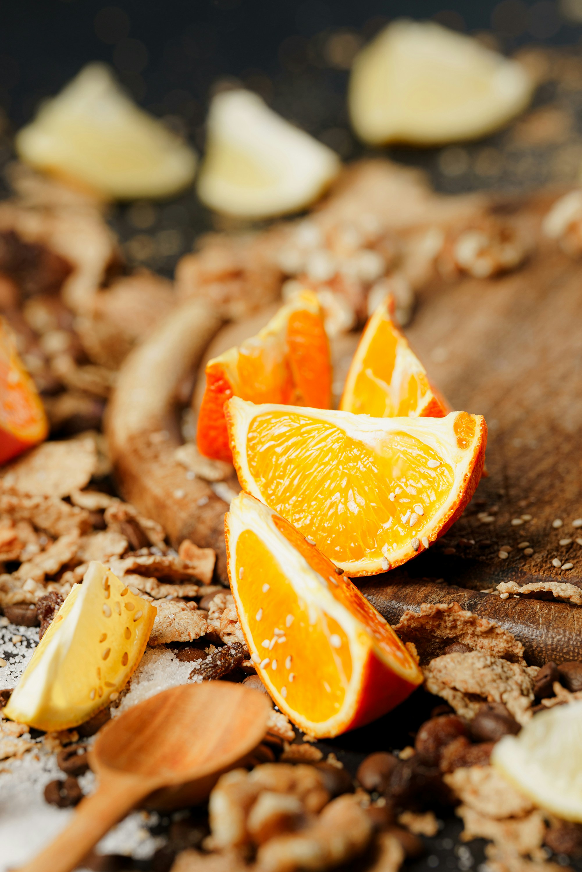Sunlit Citrus Fragments on a Rustic Board: A Macro Still-Life Study