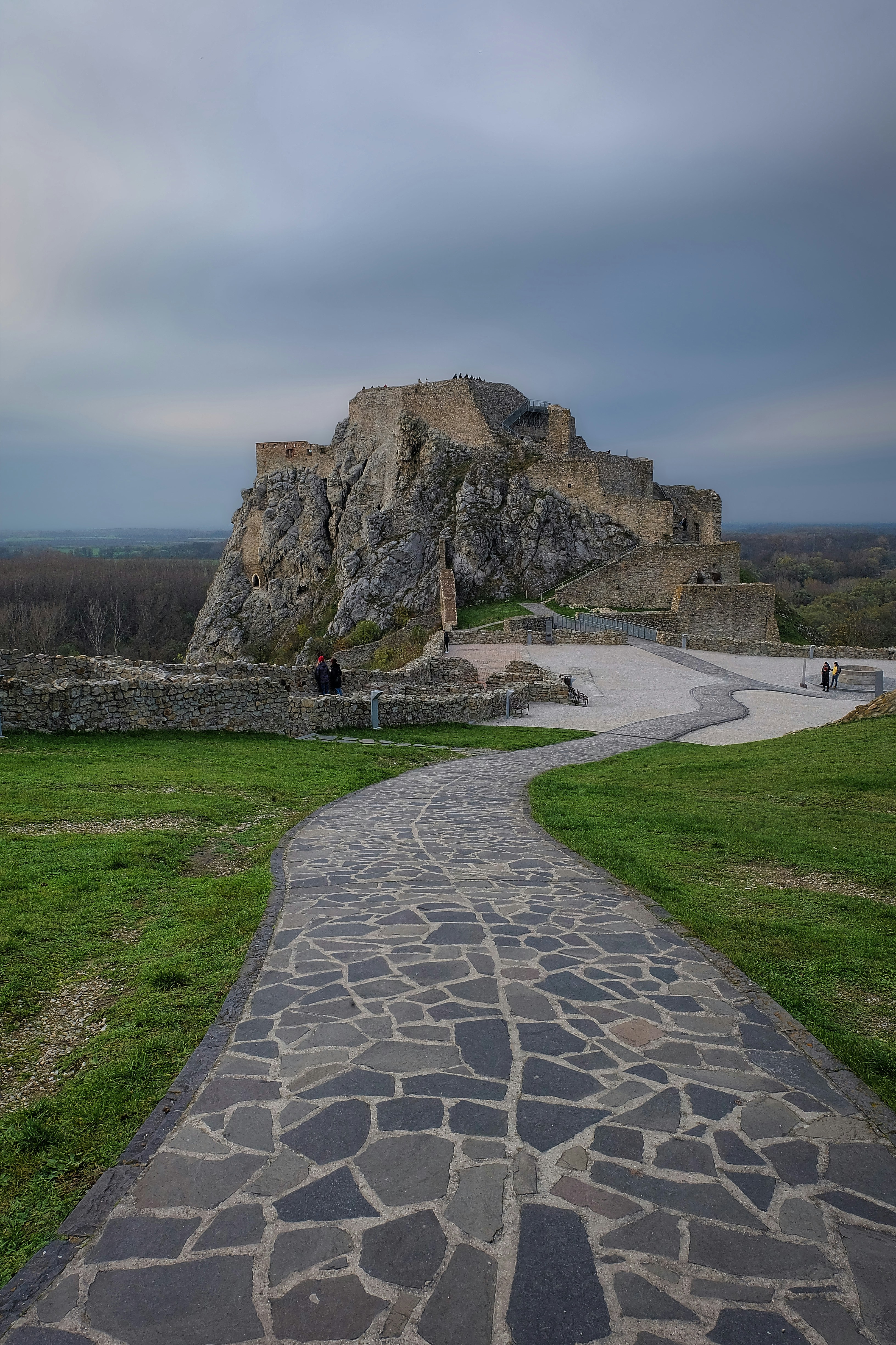 Stone pathway leads to an ancient castle. photo – Free Travel Image on ...