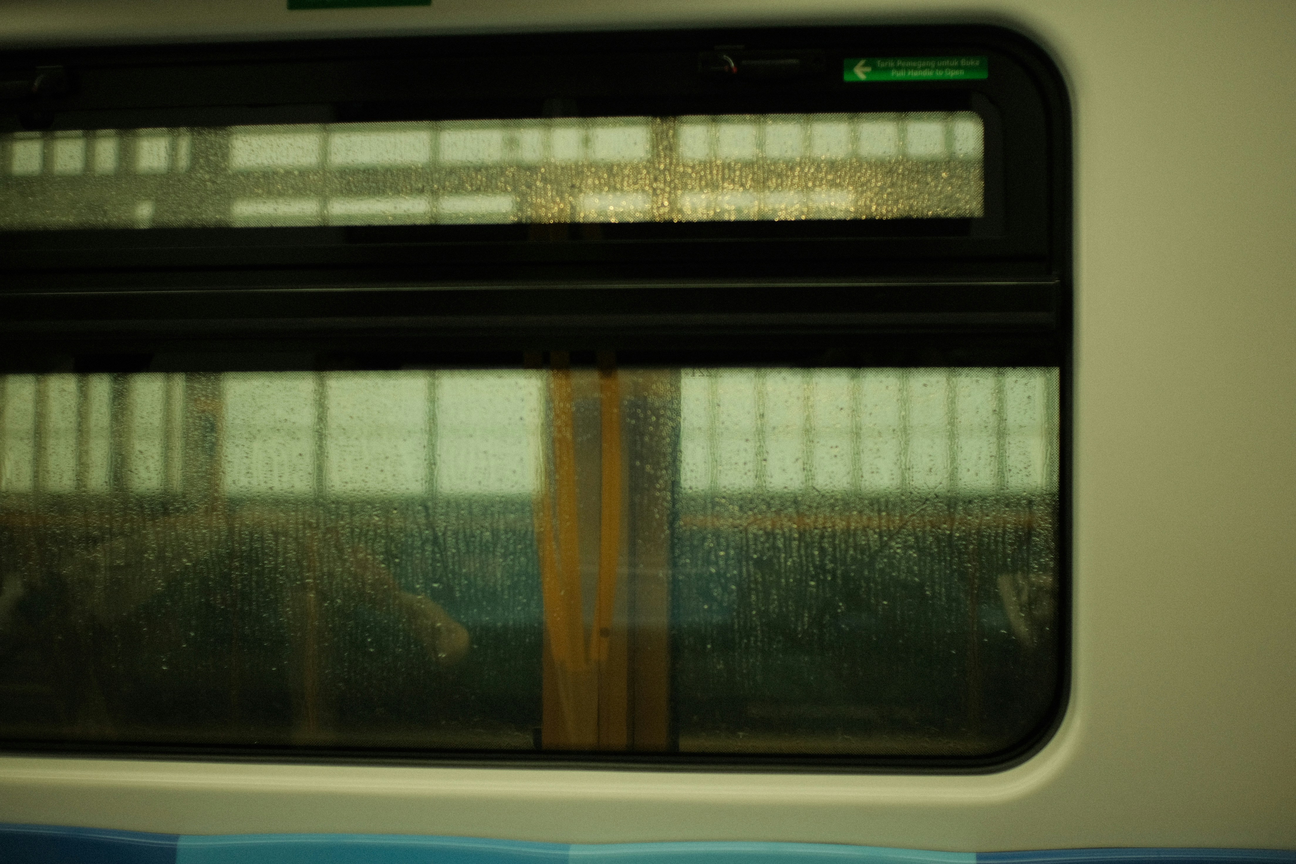 Train window showing reflections of the inside. photo – Free Car Image ...