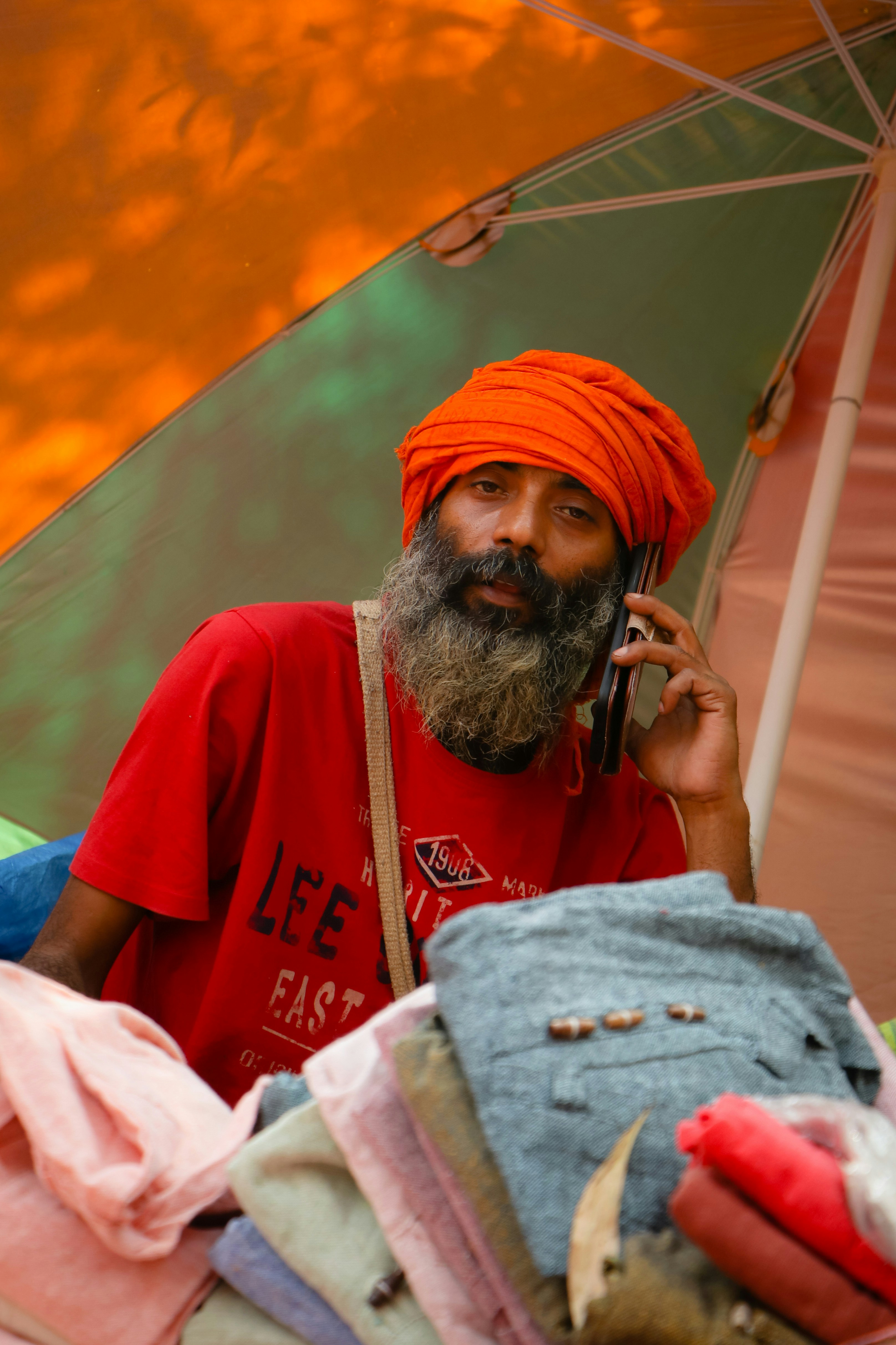 The Turbaned Connector: A Phone Call at Dusk under the Blanket Tent