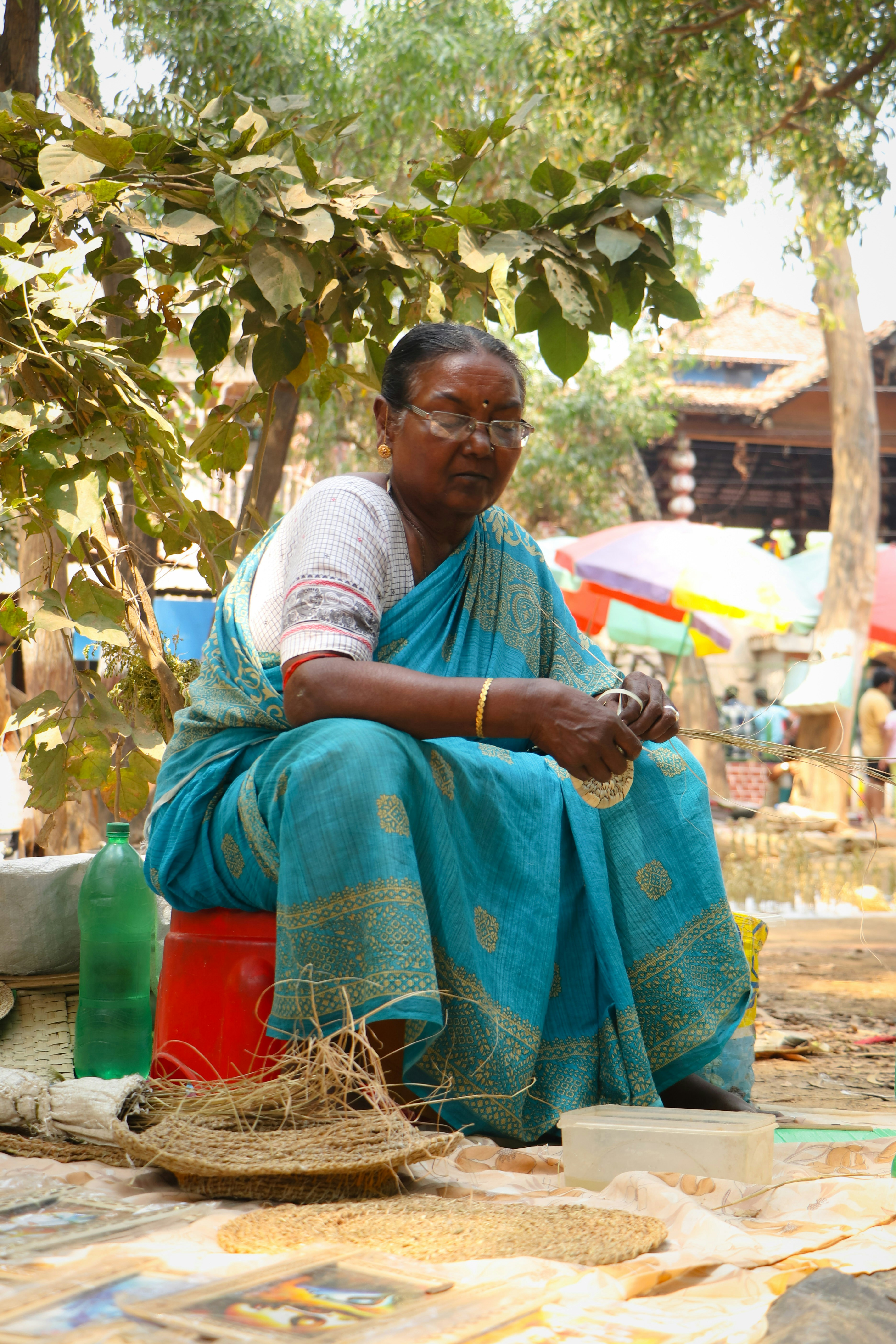 Blue Sari, Red Bucket: Quiet Grain Trade in the Market