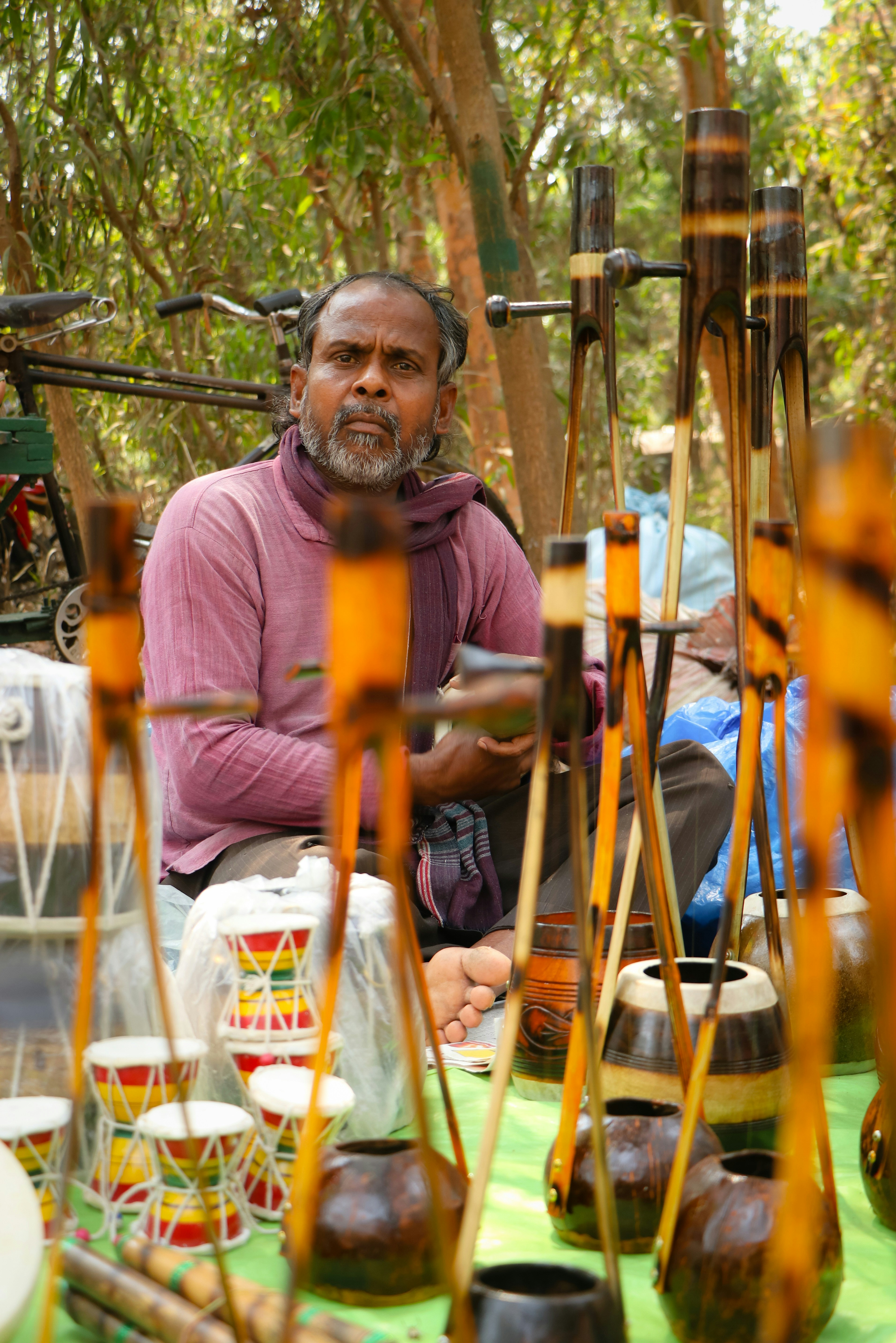 Man sells traditional musical instruments. photo – Free Human Image on ...