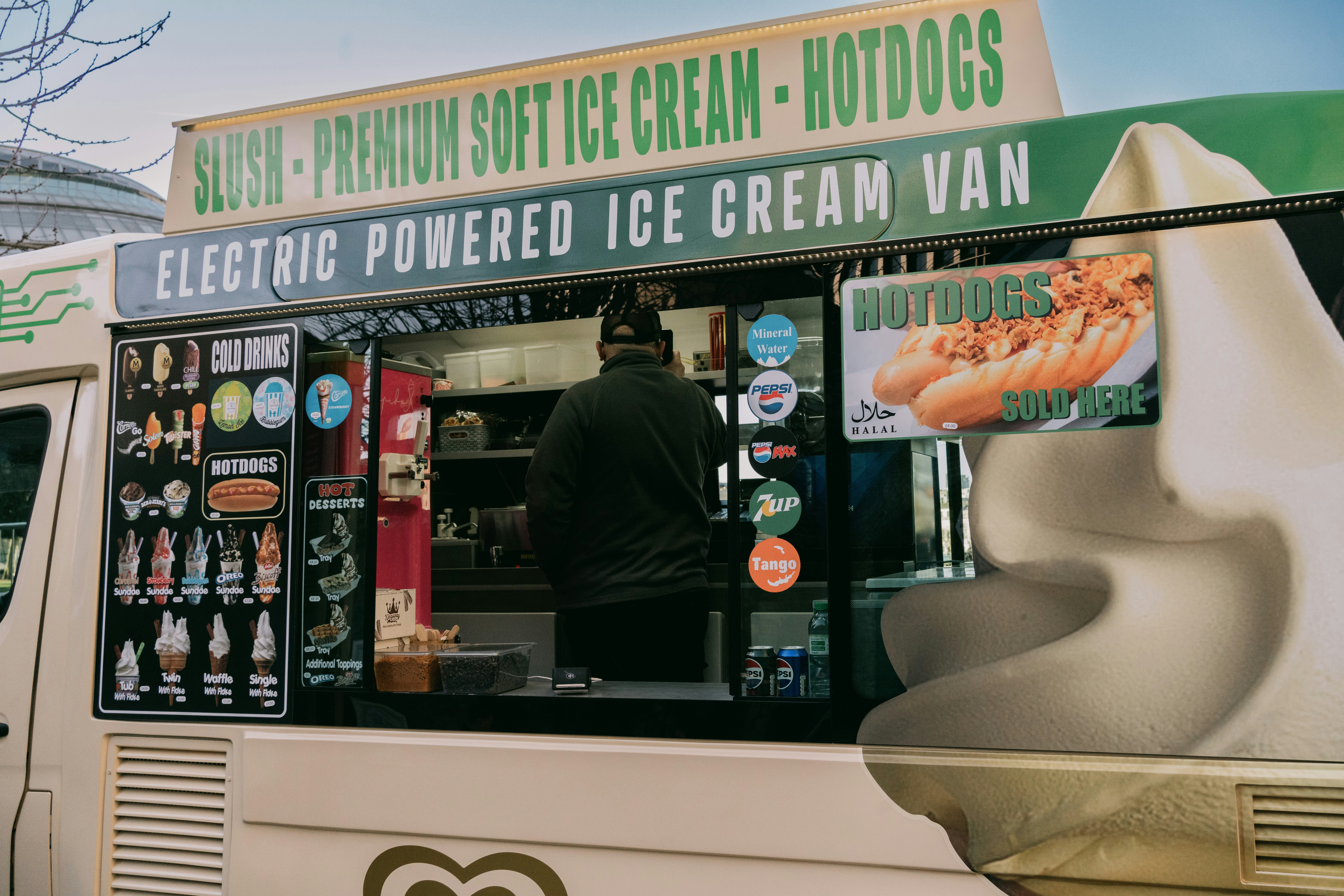 Electric-Powered Ice Cream Van Hums at the Service Window
