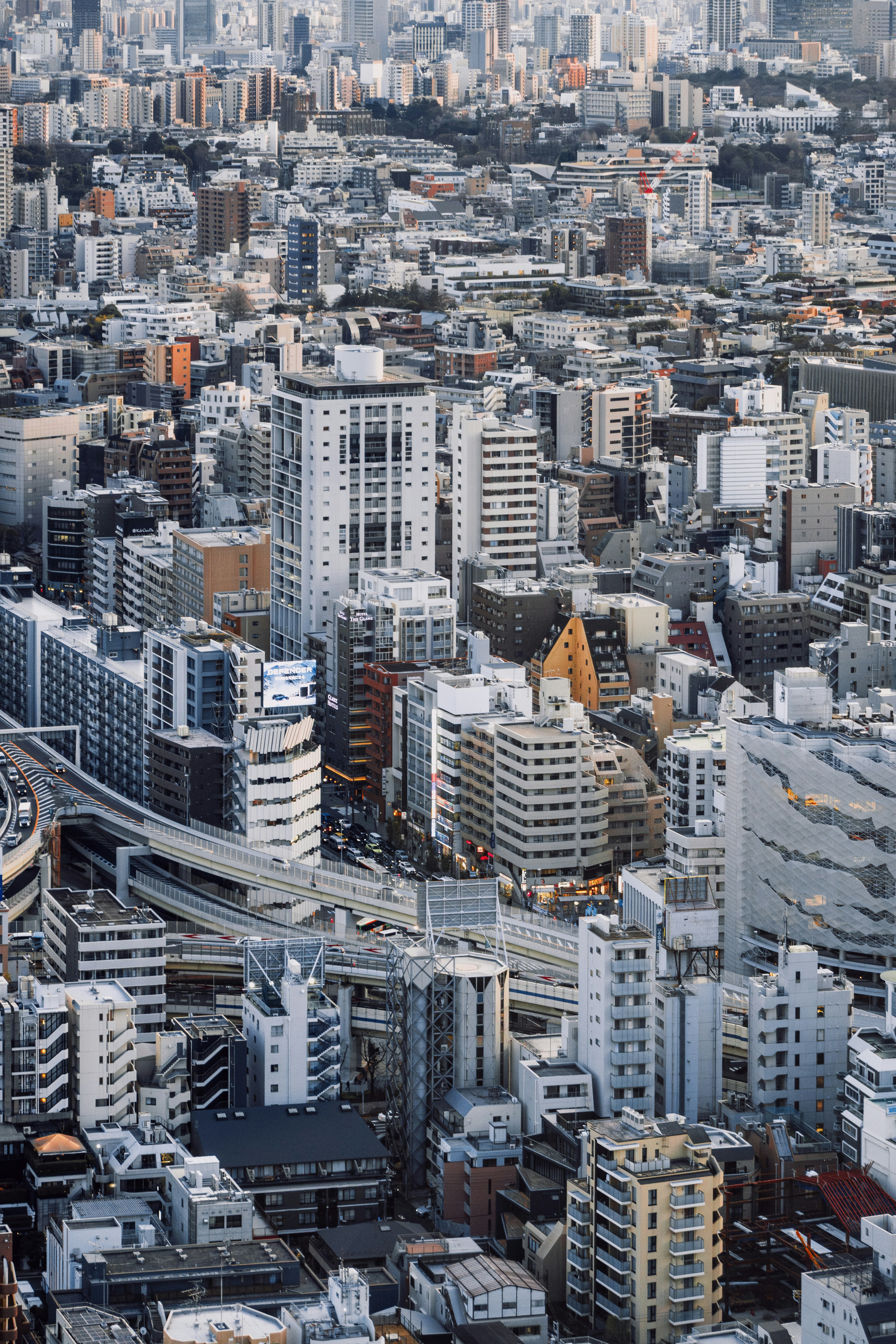 Cityscape of densely packed buildings and highways. photo – Free Tokyo ...