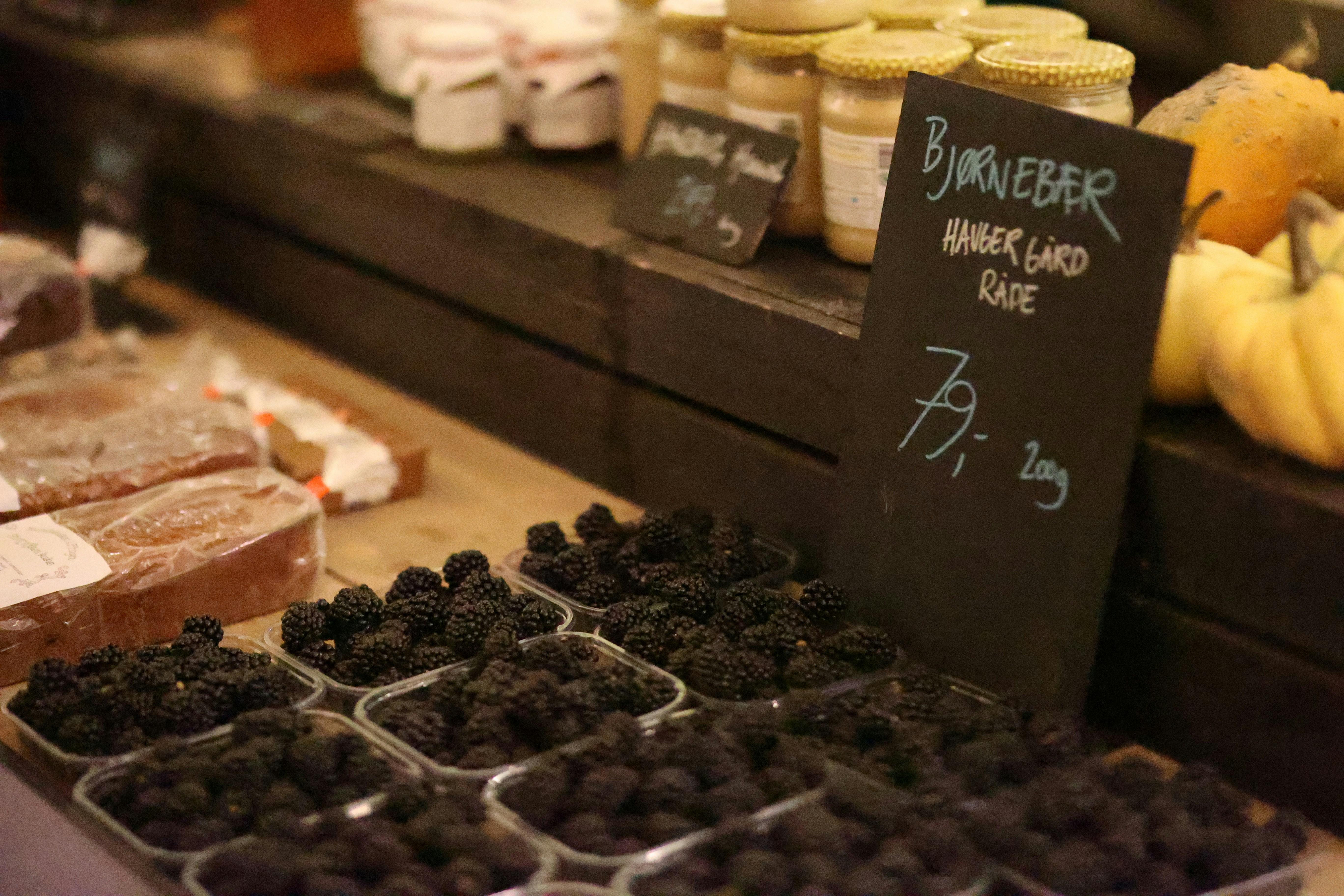 Berries for sale in a local shop in Norway | Blackberries are displayed for sale at a market.