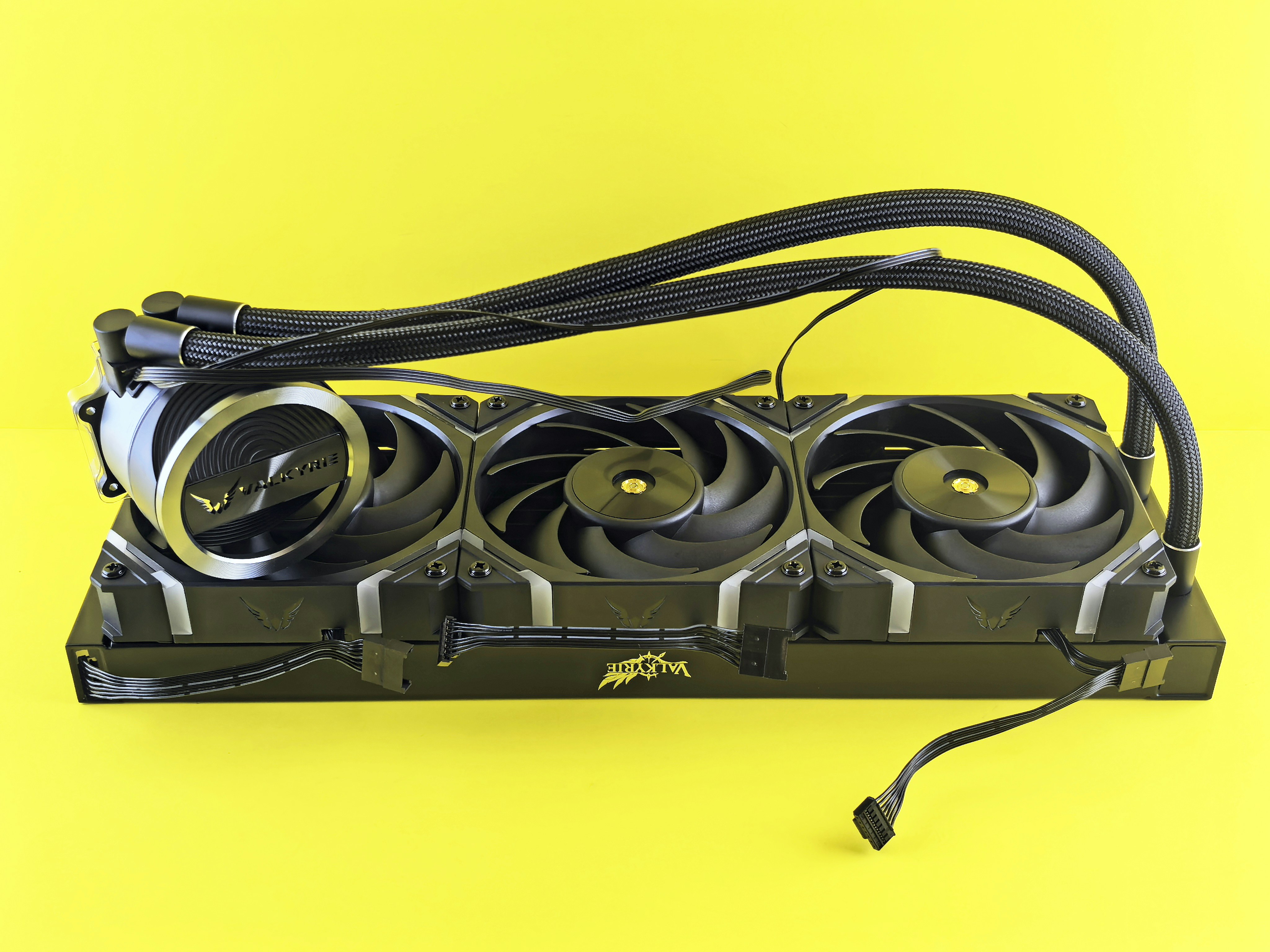 A computer water cooler sits on a yellow background. photo – Free ...