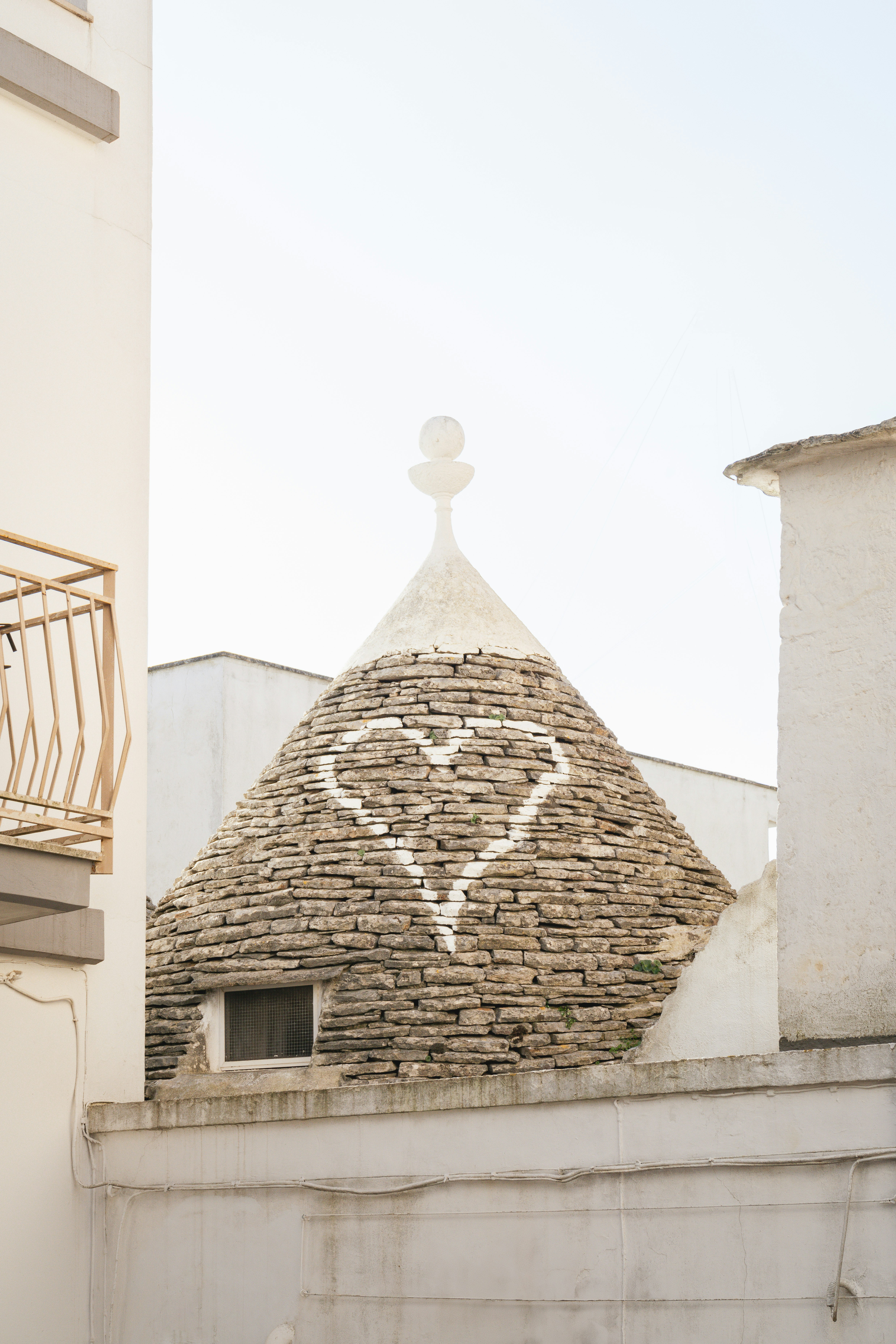 A trullo roof features a lovely painted heart. photo – Free Bari Image ...