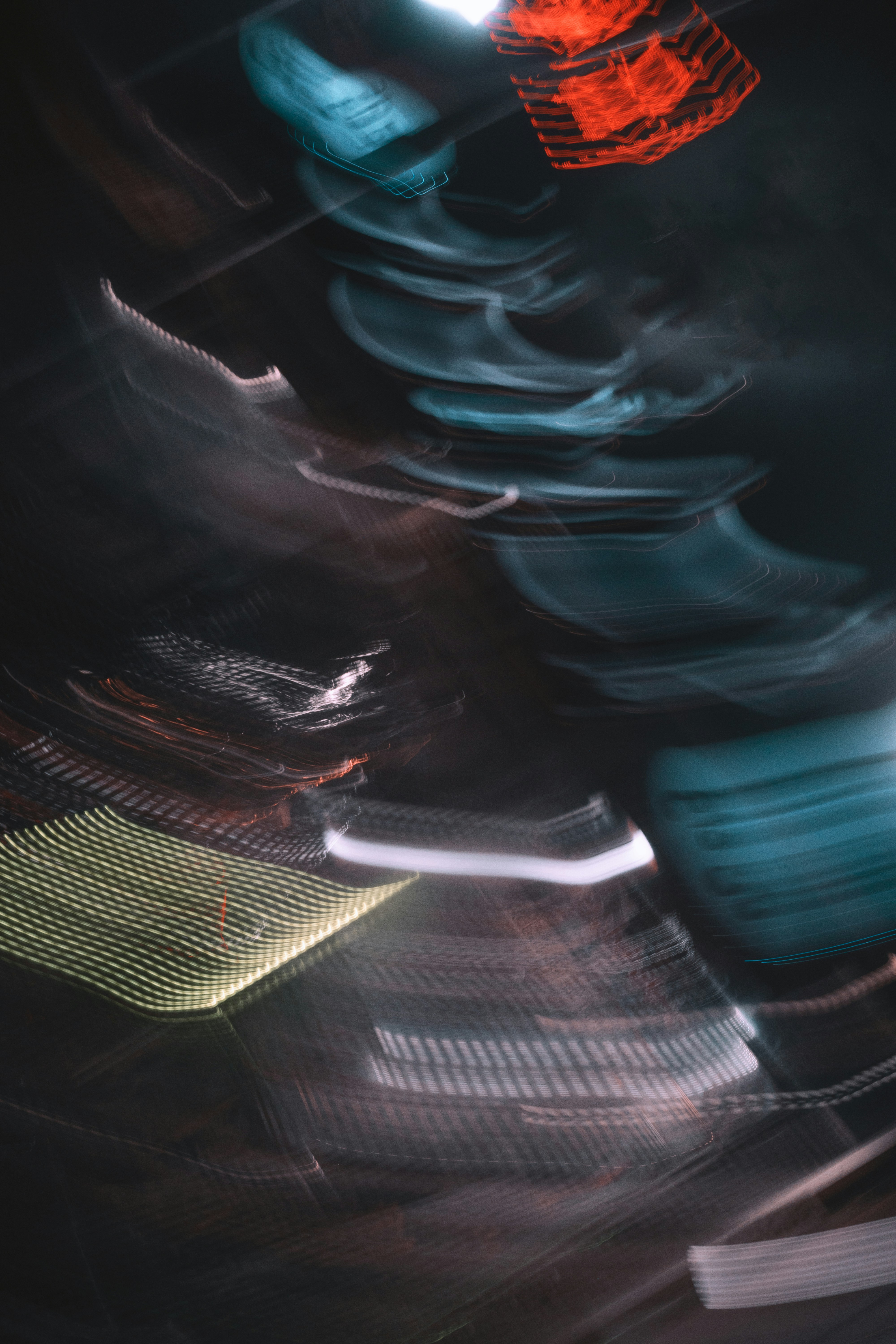 Nocturnal Neon Ribbons: A City in Slow Spin