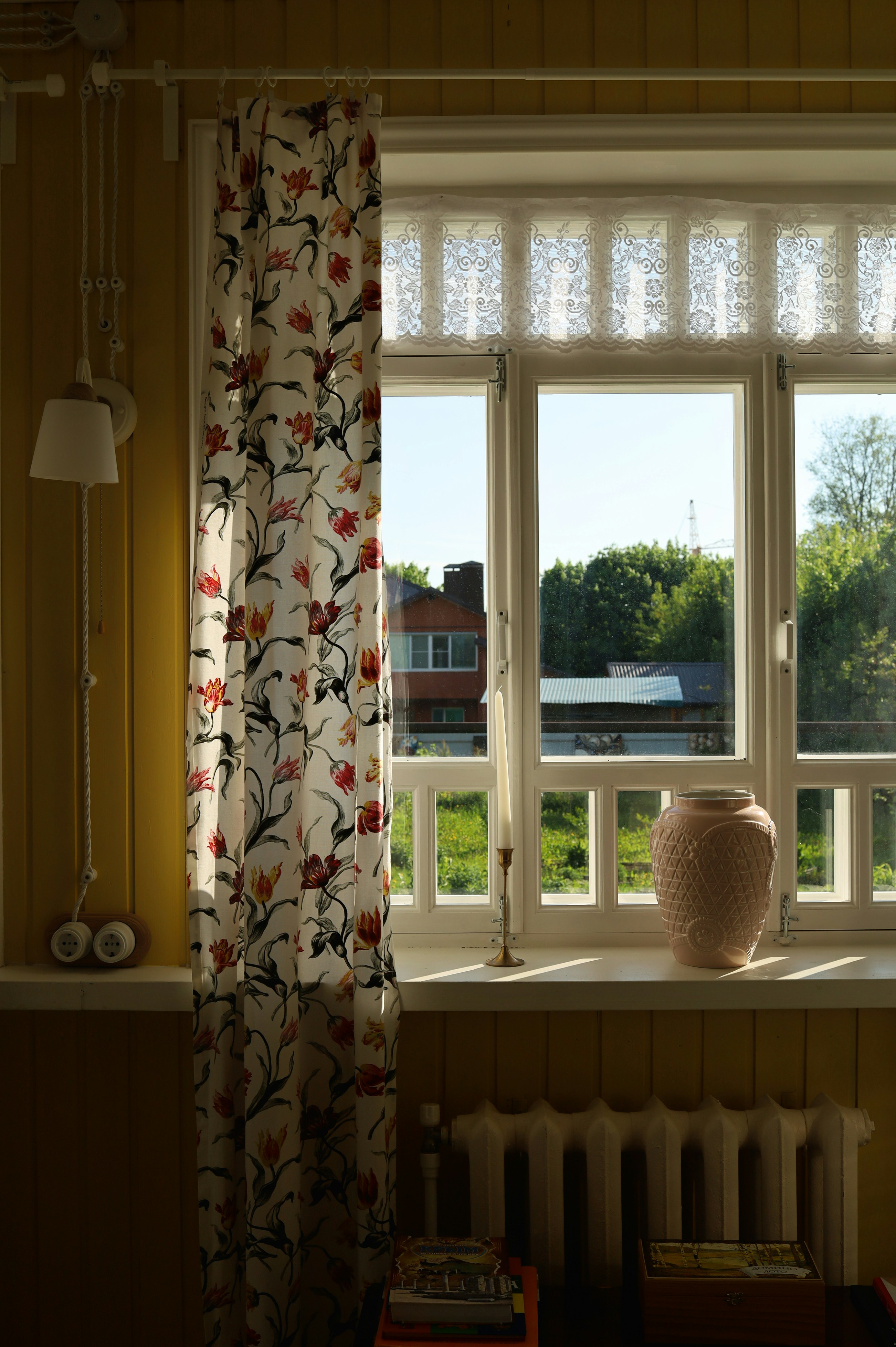Sunlit Sill: A Quiet Corner by the Window with Floral Curtain