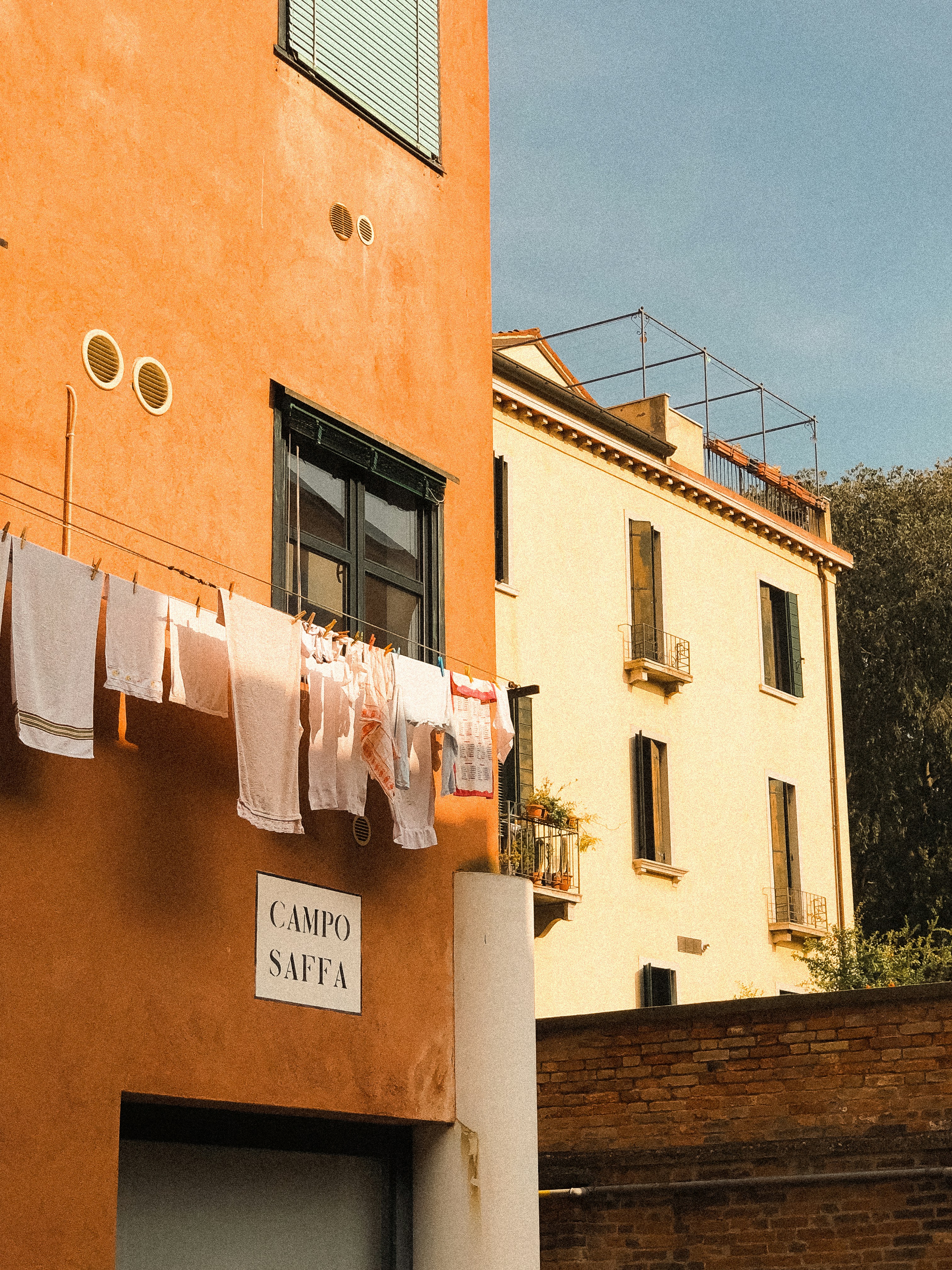 Laundry Lines Across an Italian Facade