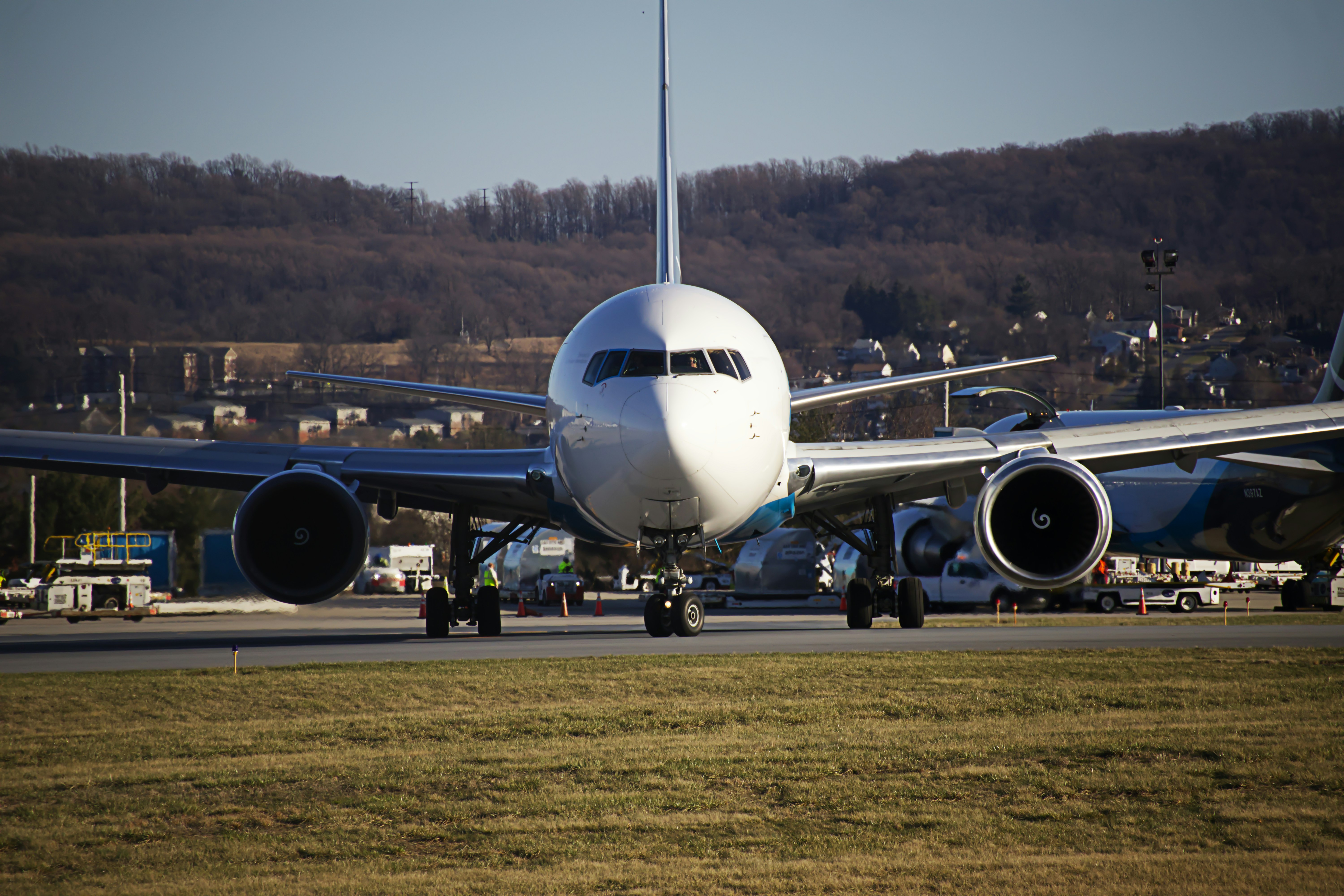 A plane is on the runway, ready for takeoff. photo – Free Airplane ...