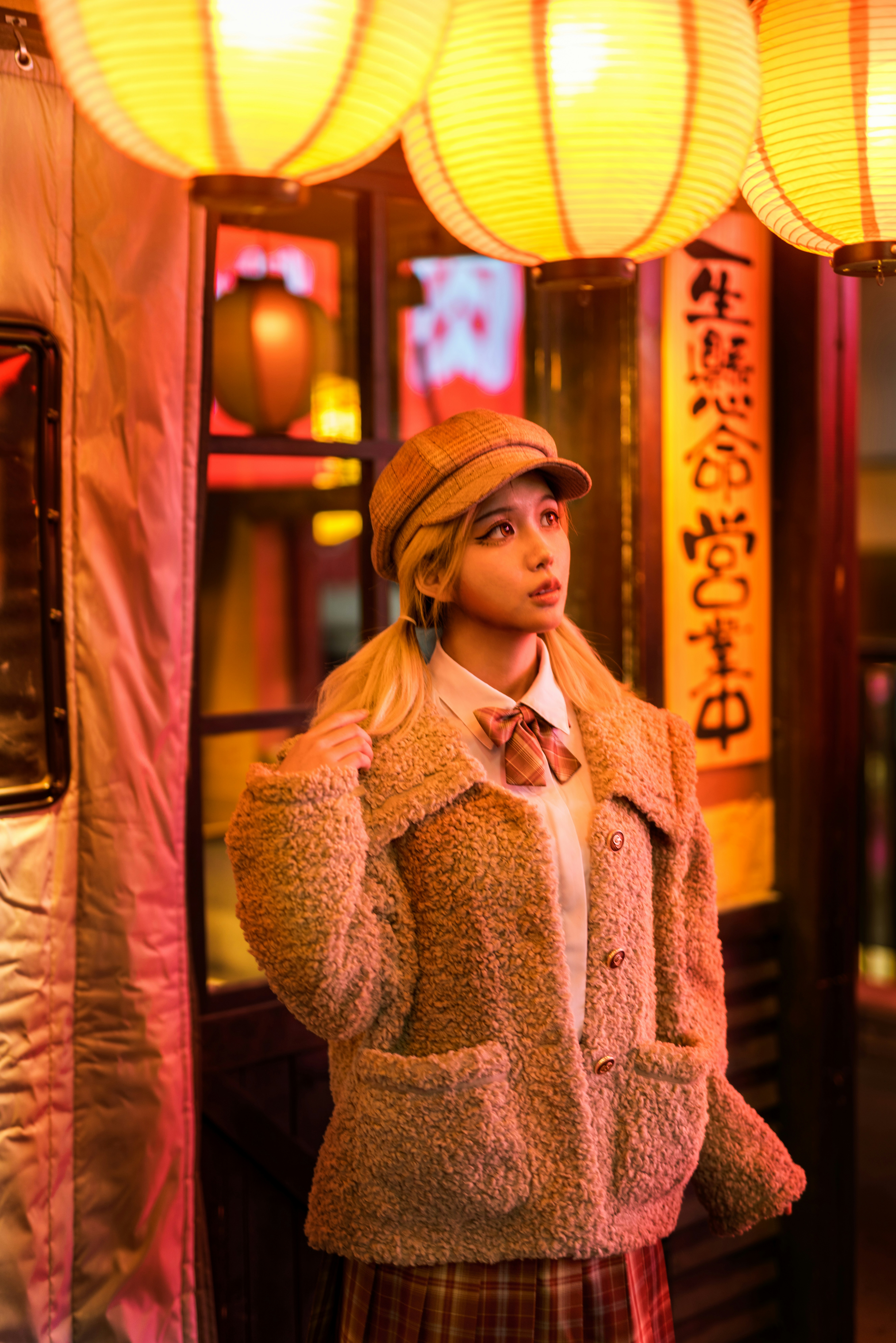A stylish woman poses under glowing lanterns. photo – Free Portrait ...