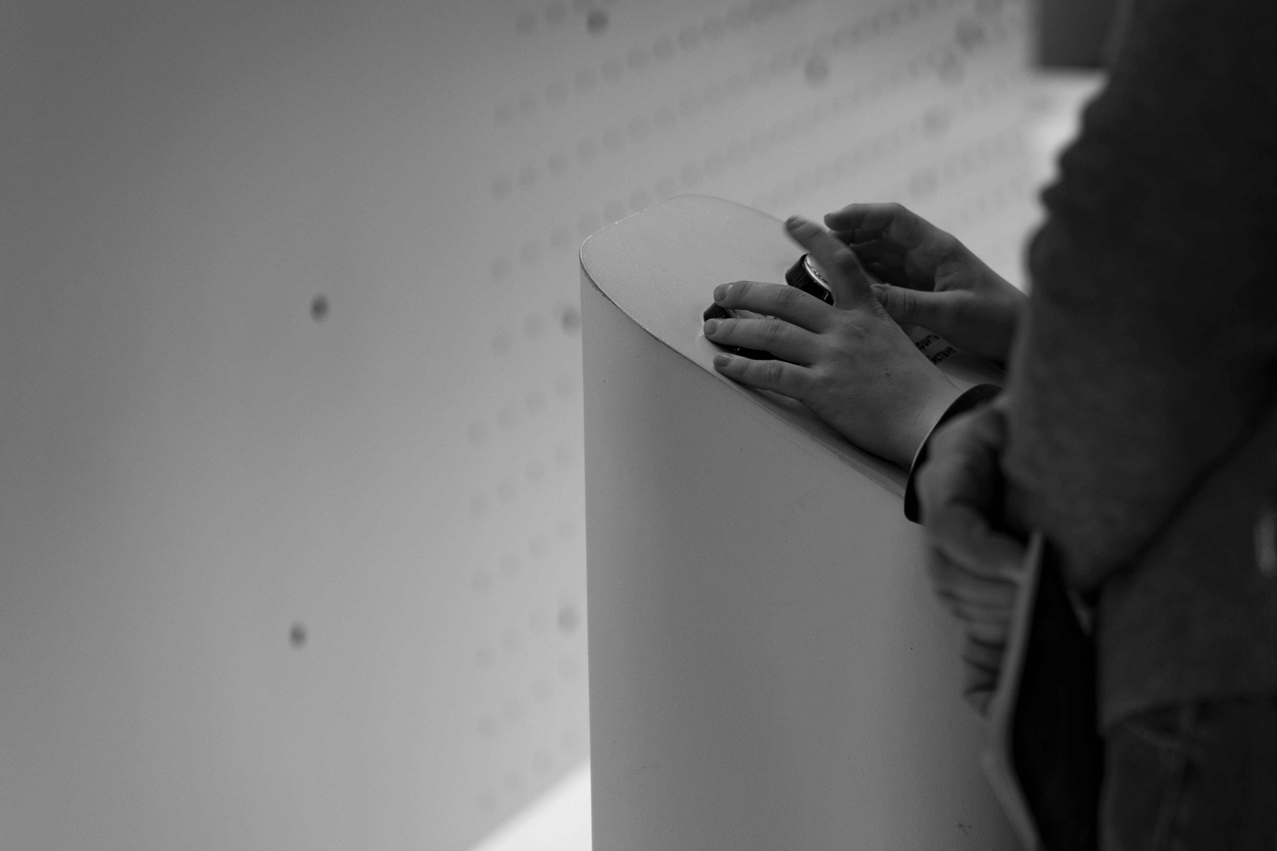 Hands on the Edge: A Quiet Interaction with a Curved Barrier