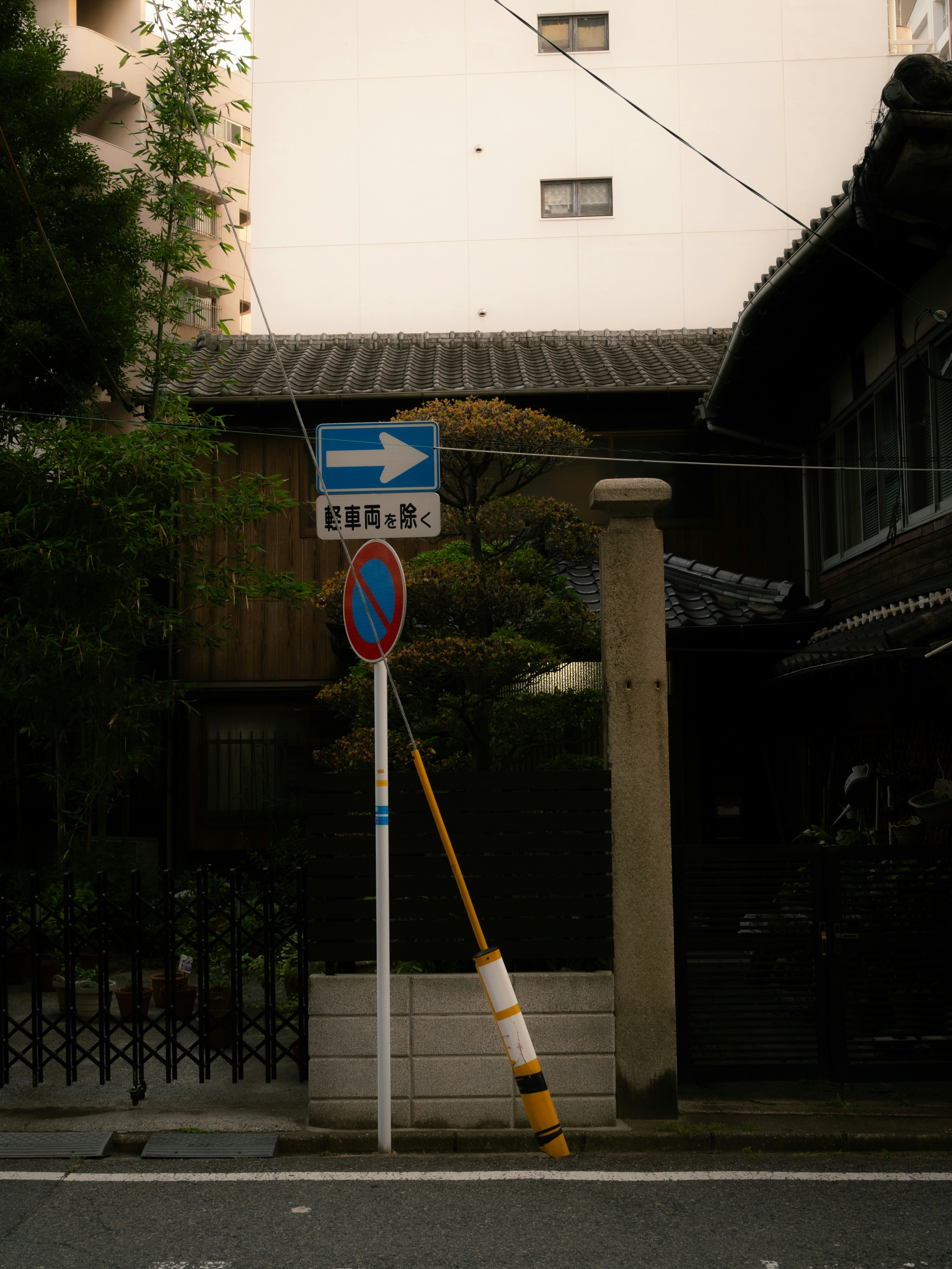 Japanese street signs stand in an urban setting. photo – Free City ...