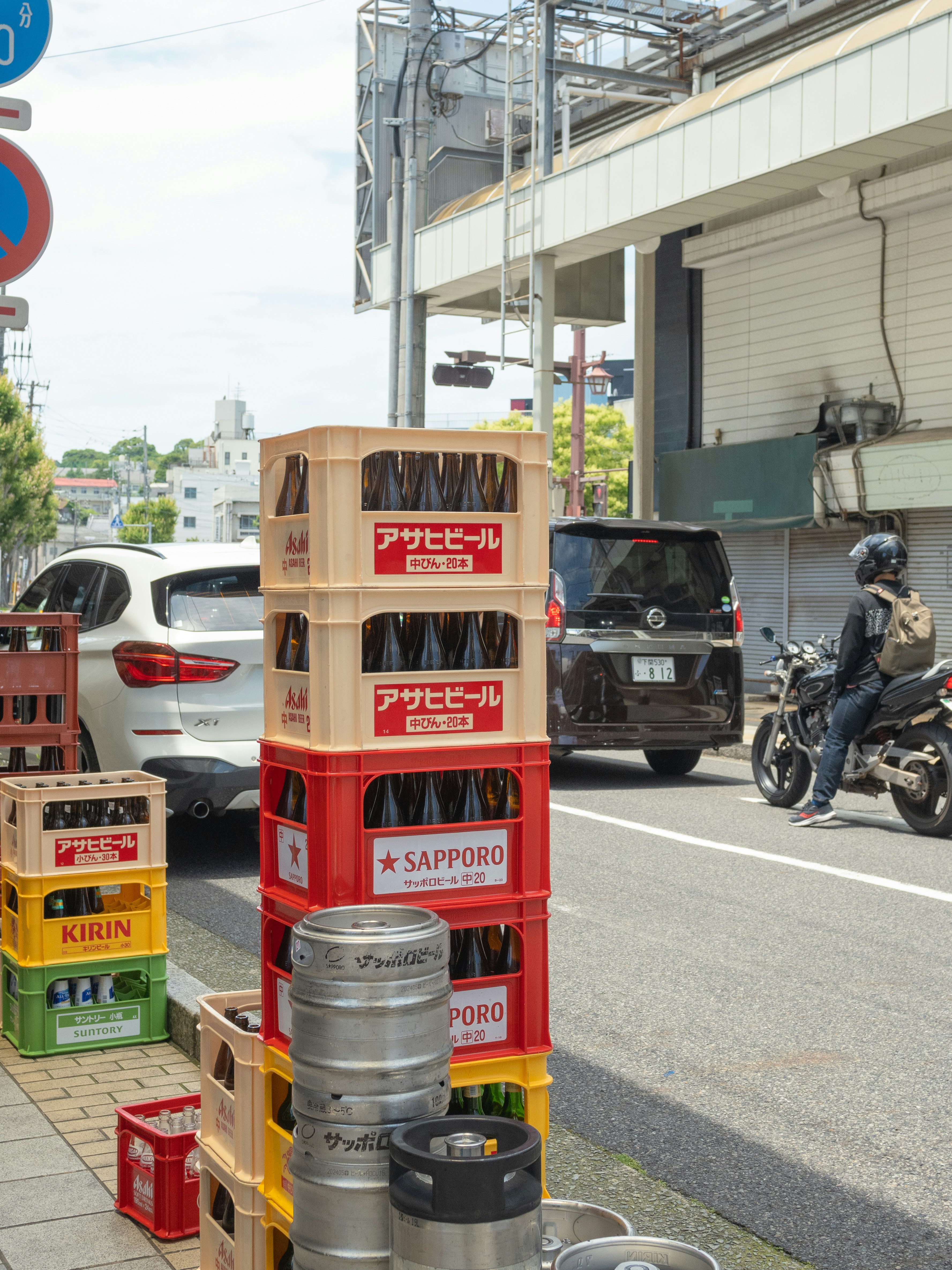 Underpass Crate Tower: A Quiet Street Portrait