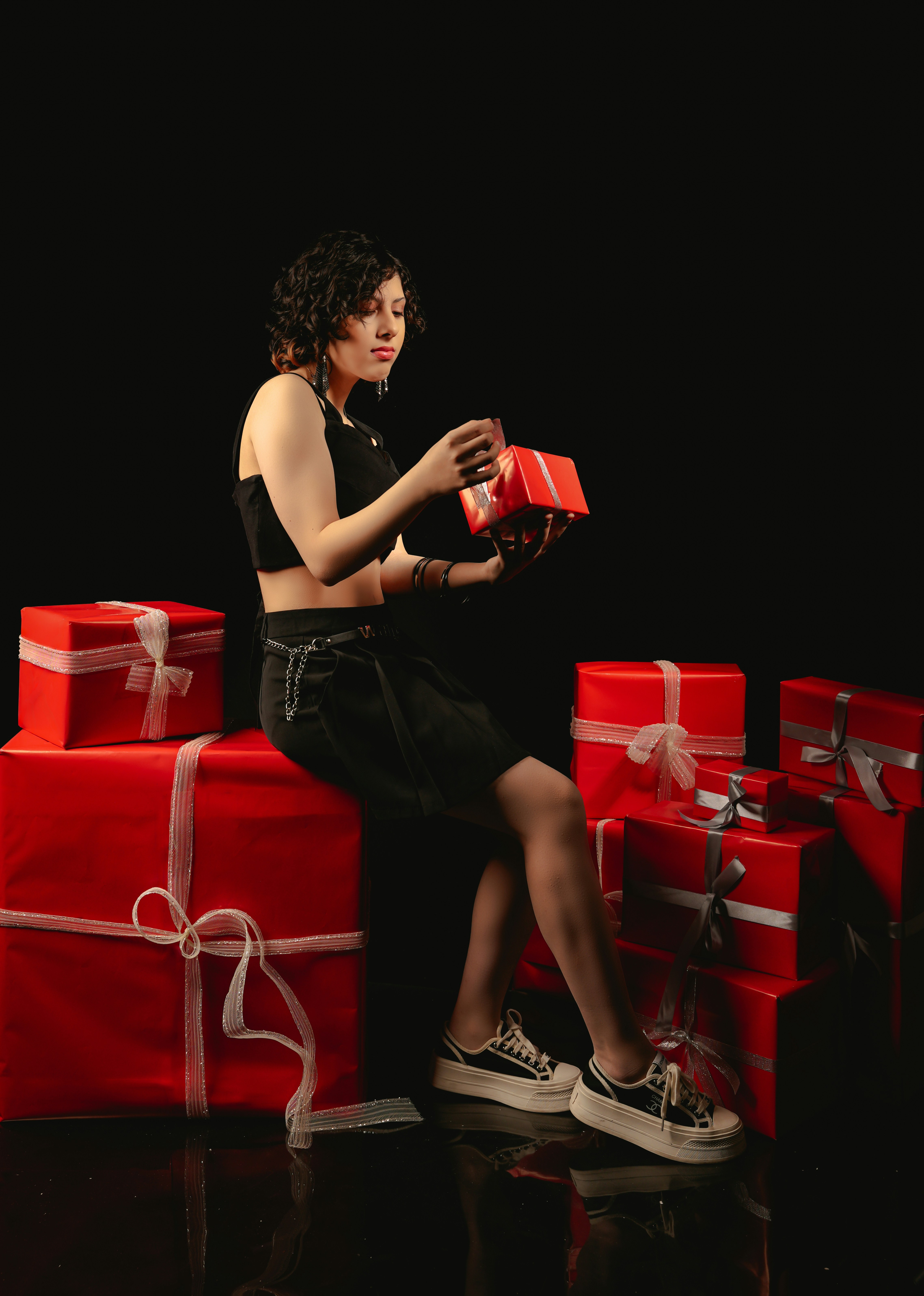 Gift-wrapped Moments: A Quiet Moment Among Red Ribbons