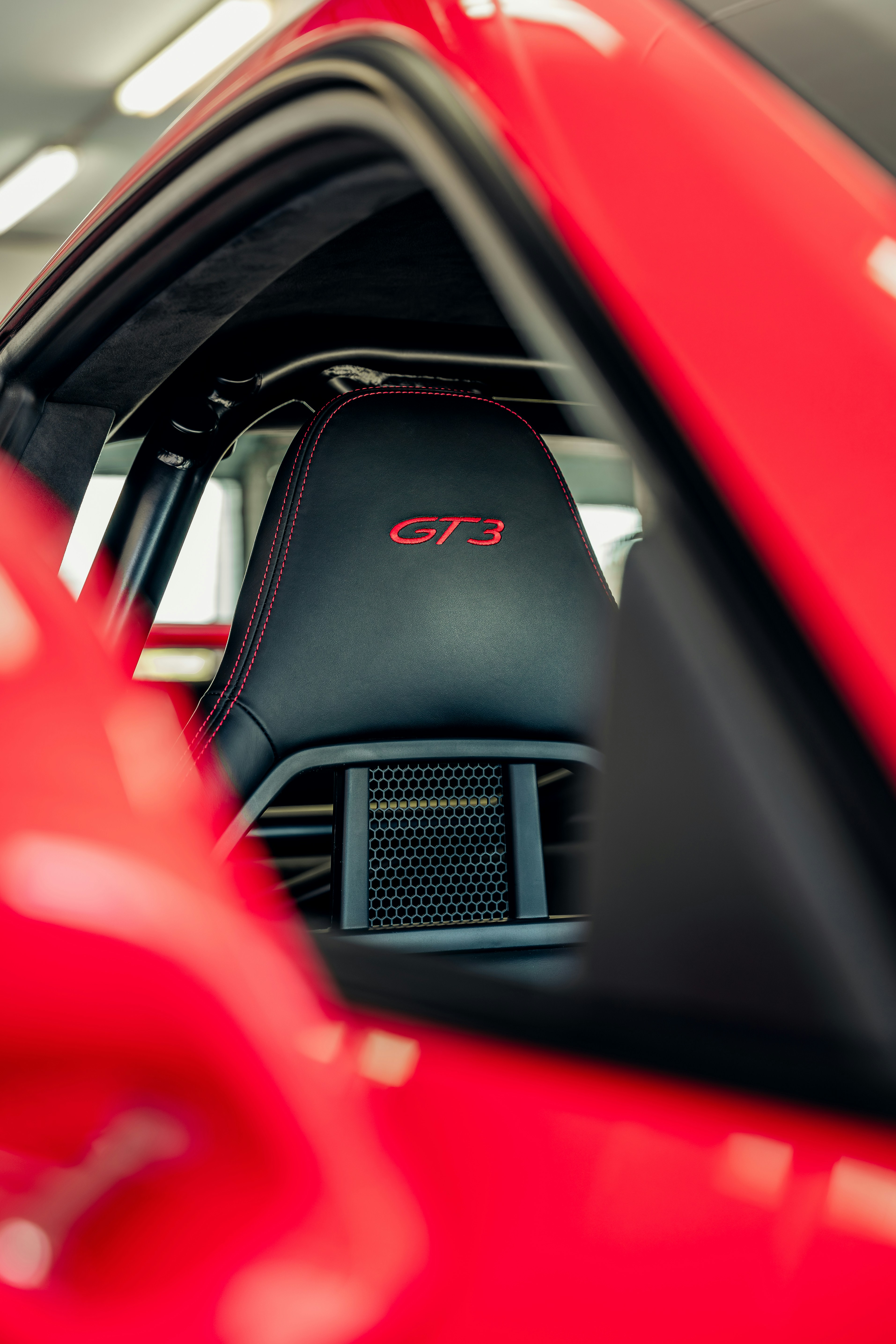 A porsche gt3 seat is visible through the frame. photo – Free Car Image ...