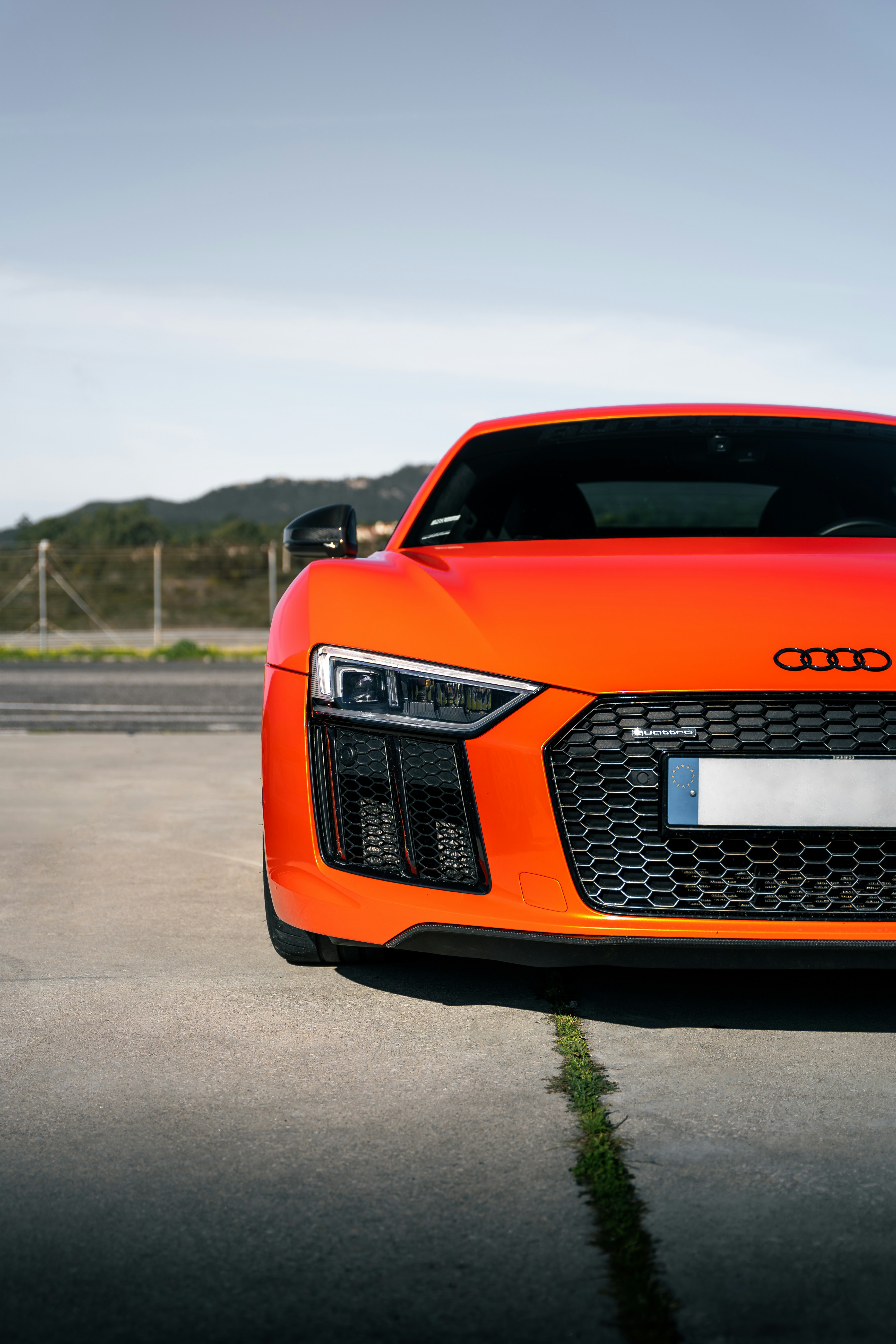 A bright orange audi r8 sports car. photo – Free Sports car Image on ...