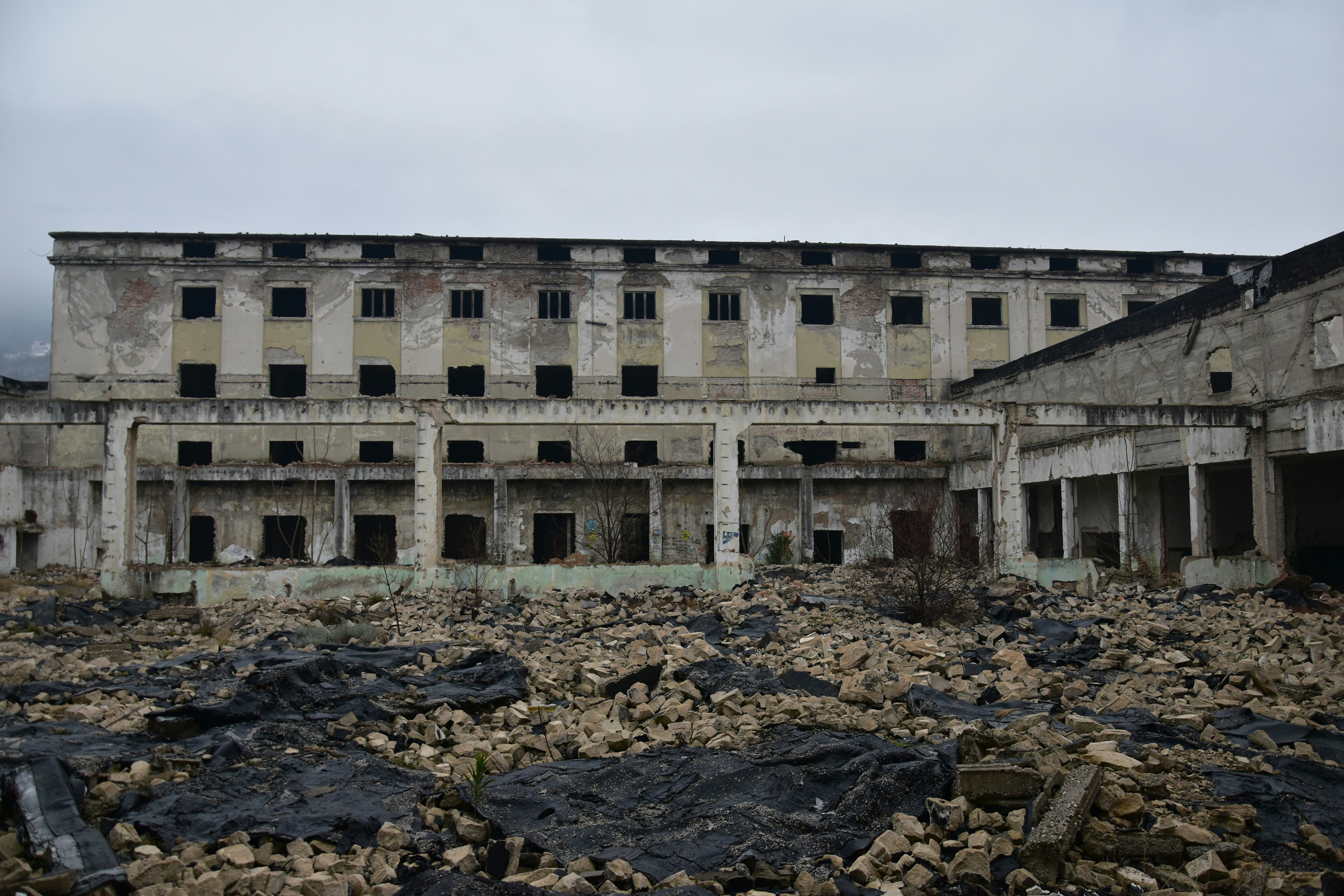 Ruins of a building after a devastating event.
