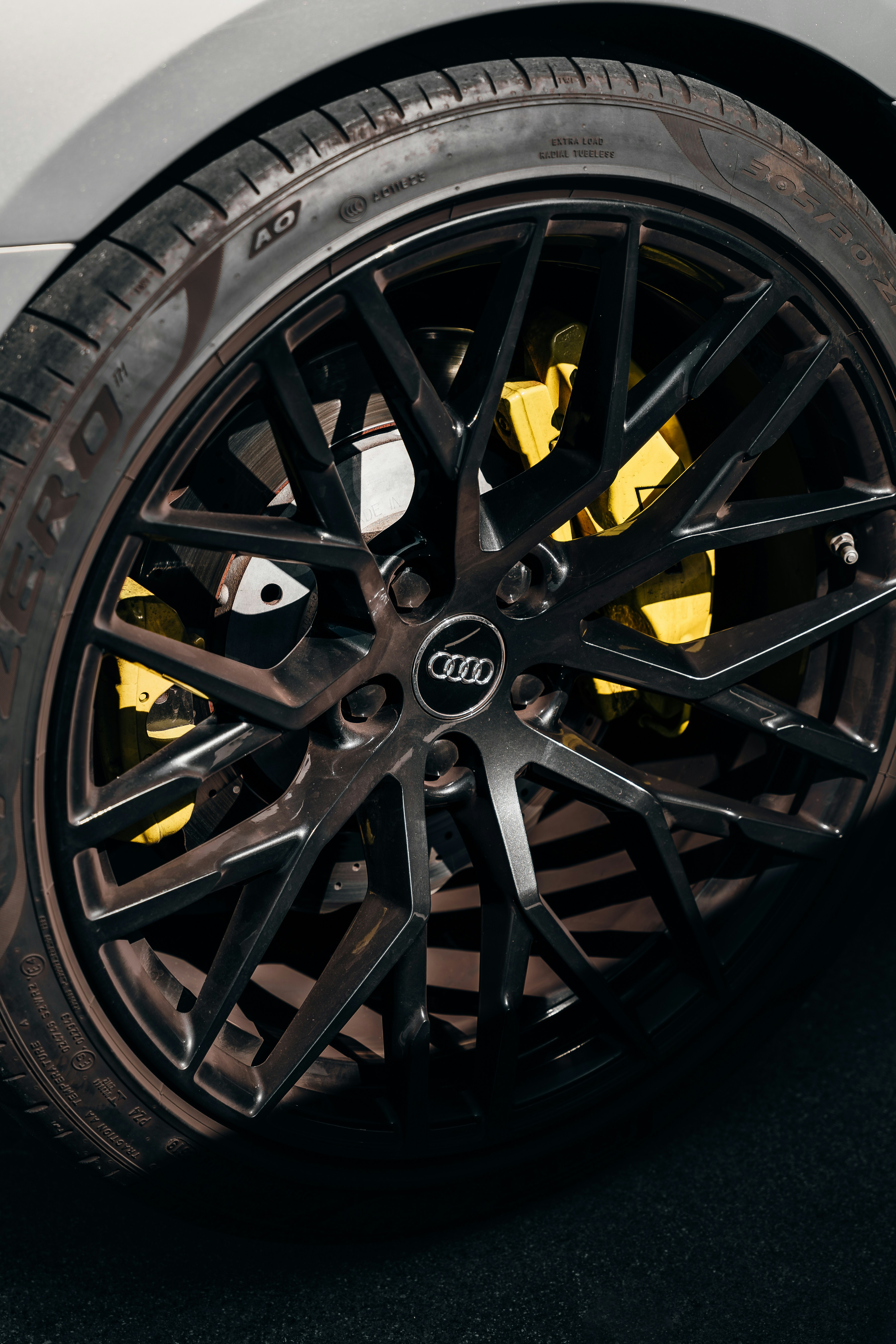 Audi car wheel with yellow brake calipers. photo – Free Car Image on ...