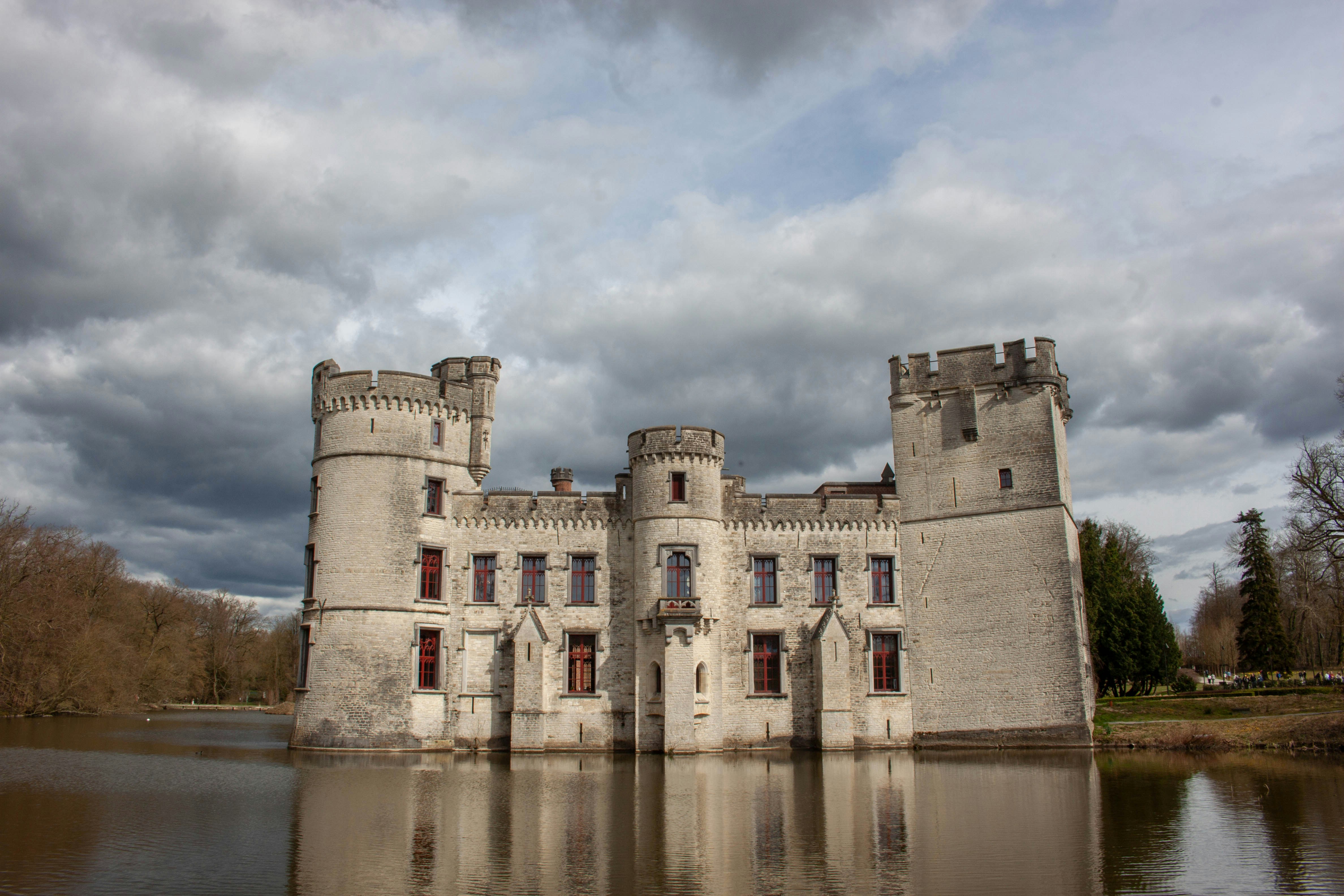A majestic castle floats on the water. photo – Free Building Image on ...