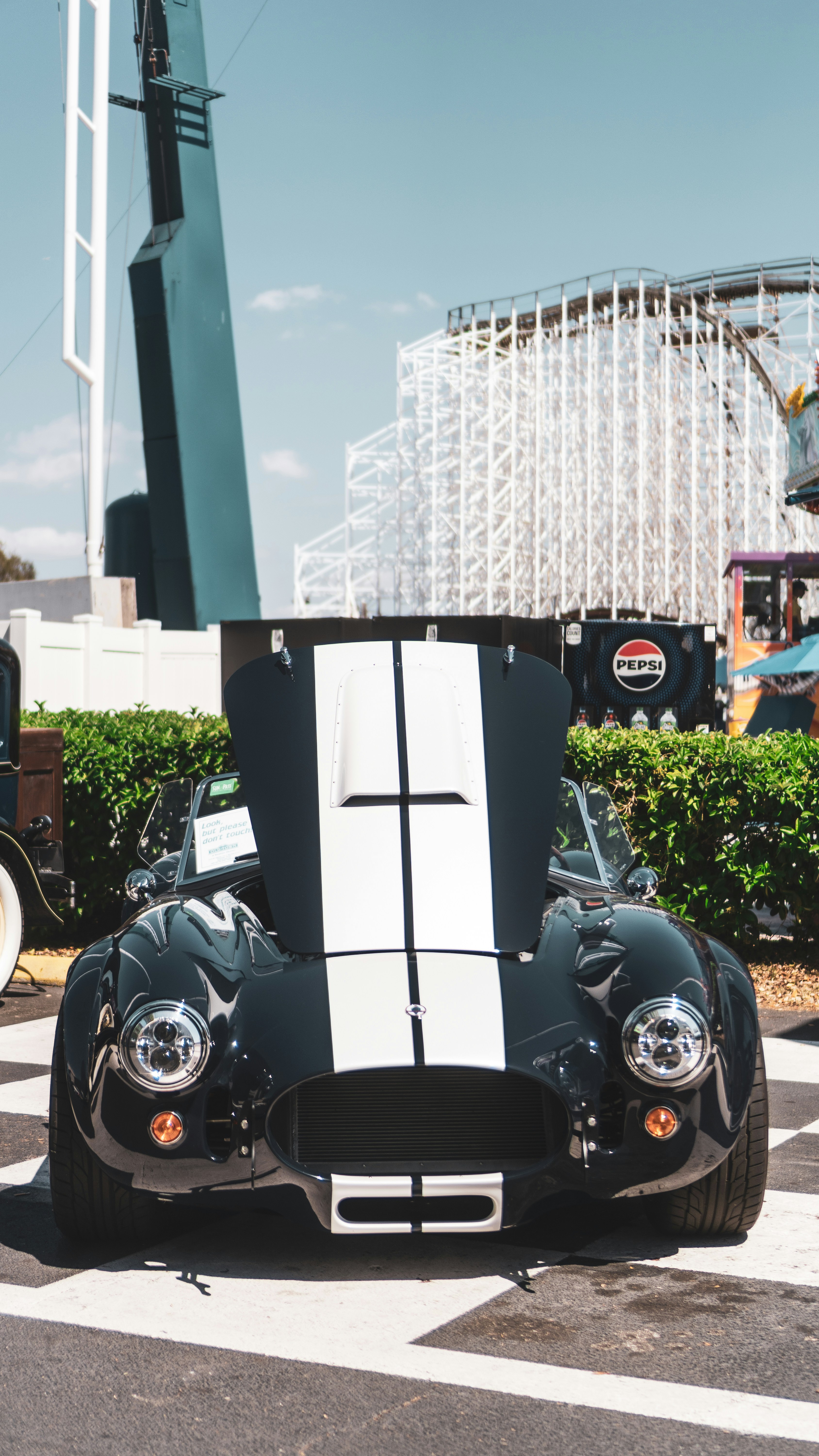 A classic car with white stripes on the hood. photo – Free Car Image on ...