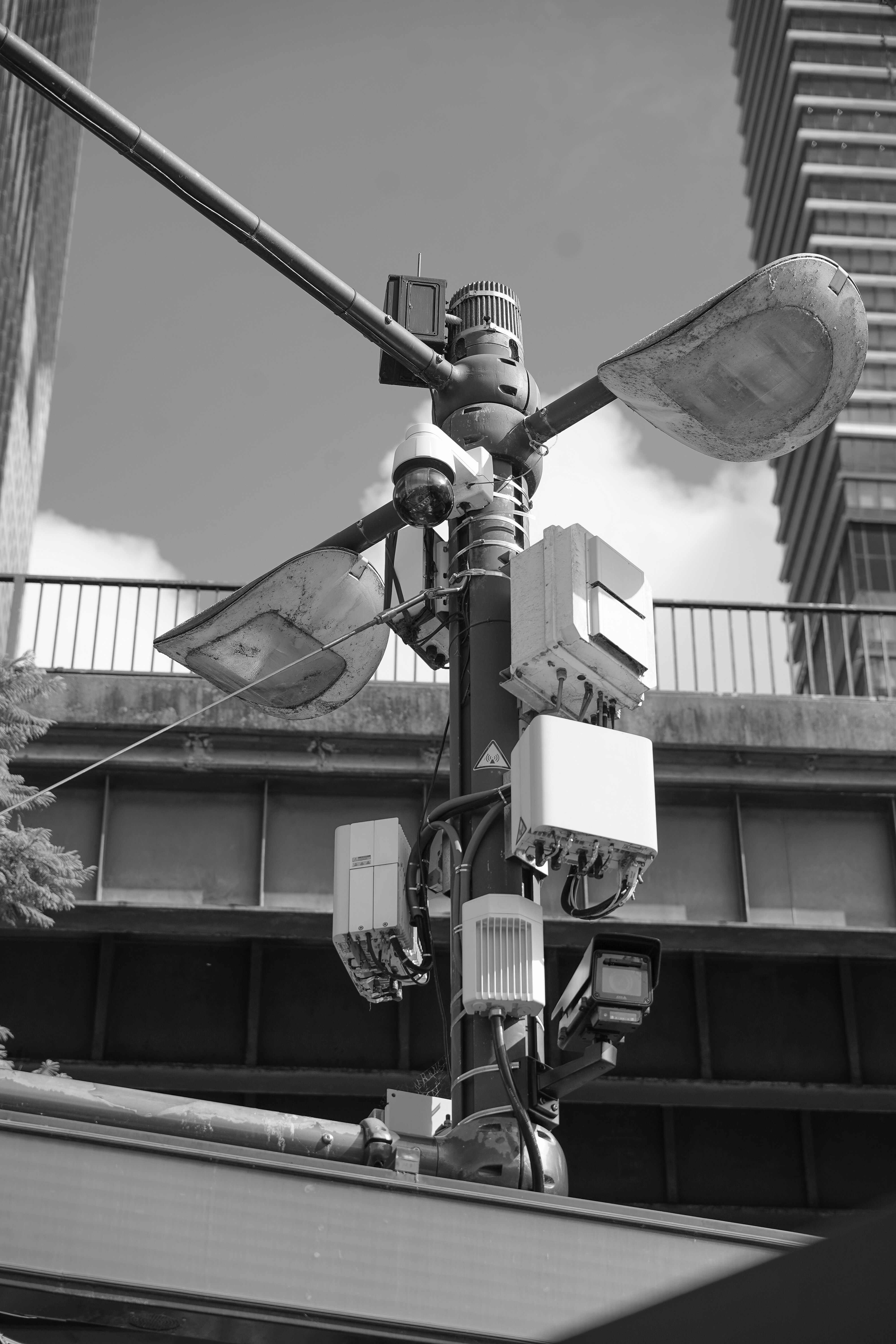 A streetlight pole is covered with technology. photo – Free Urban Image ...