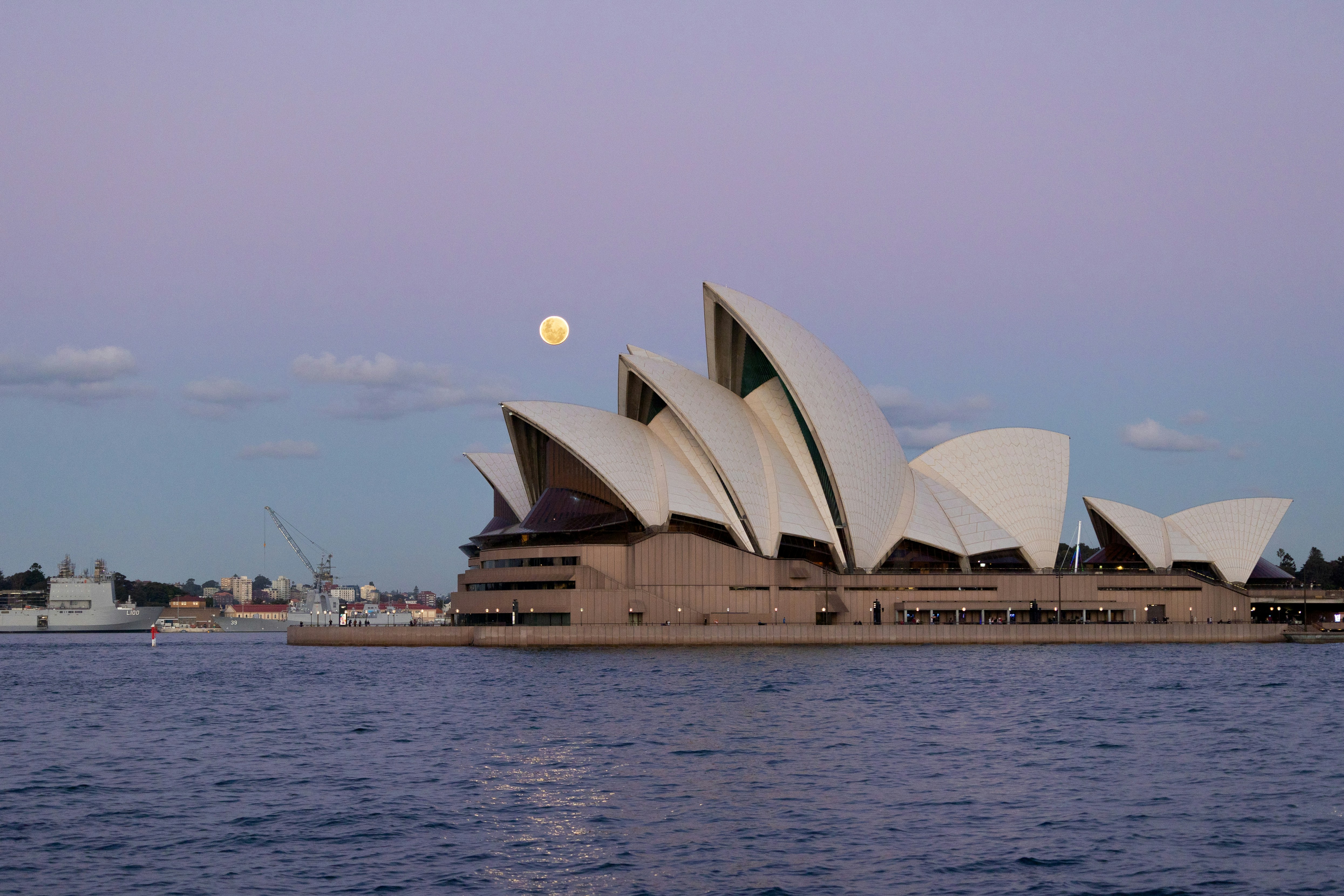 The sydney opera house glows under the moon. photo – Free Sydney opera ...