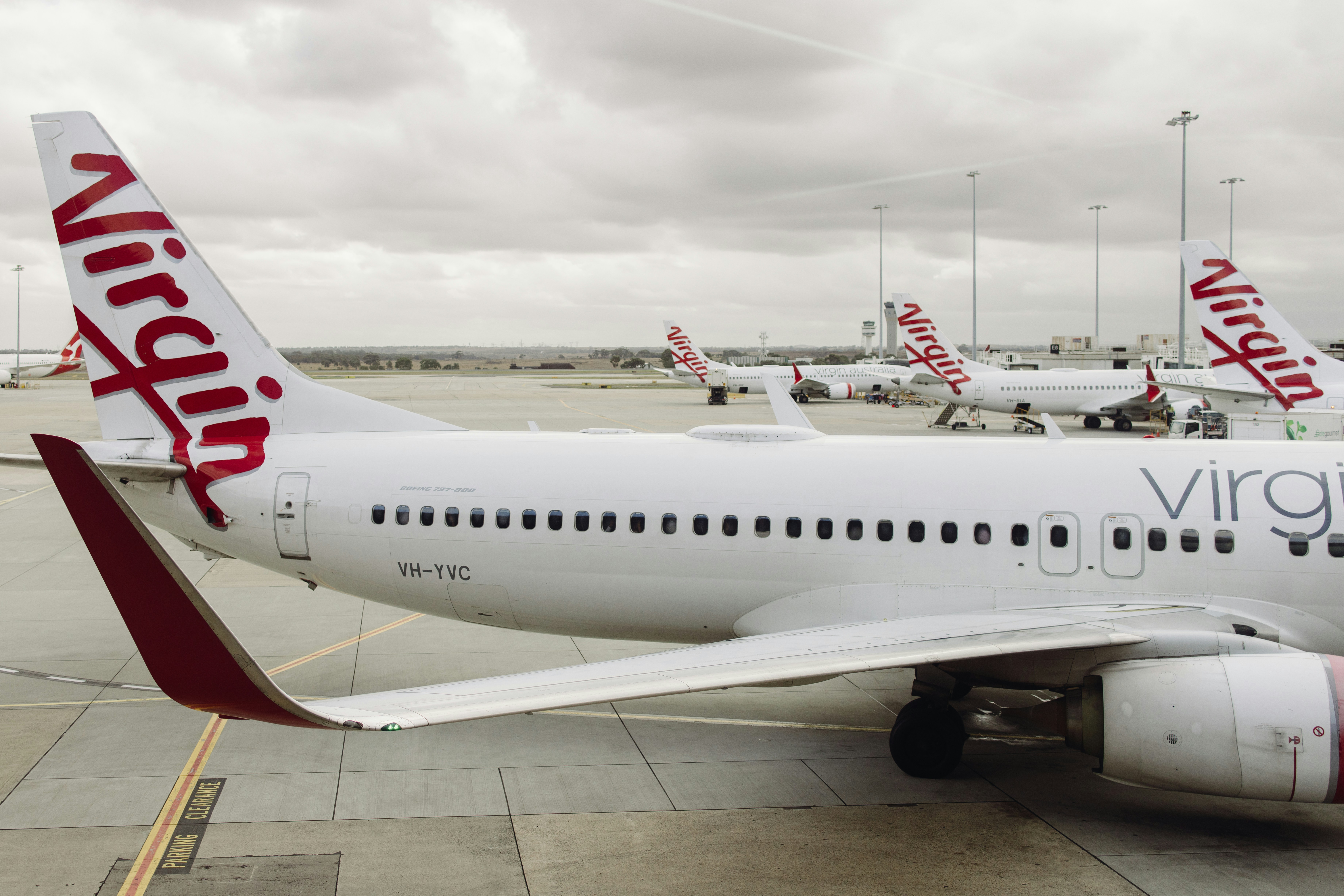 Virgin australia planes are on the ground at the airport. photo – Free ...