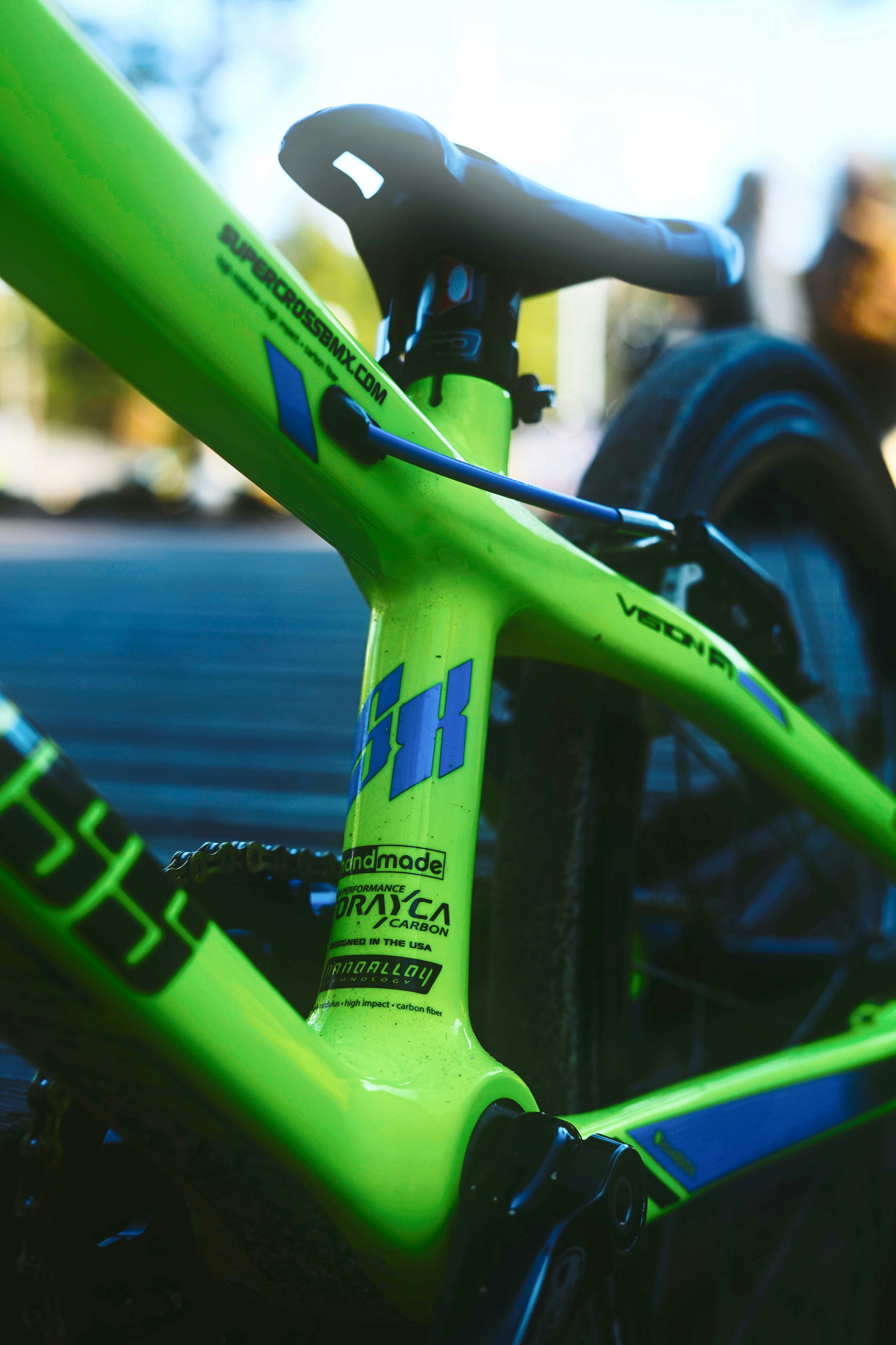 A green bicycle frame is pictured up close. photo – Free Bike Image on ...