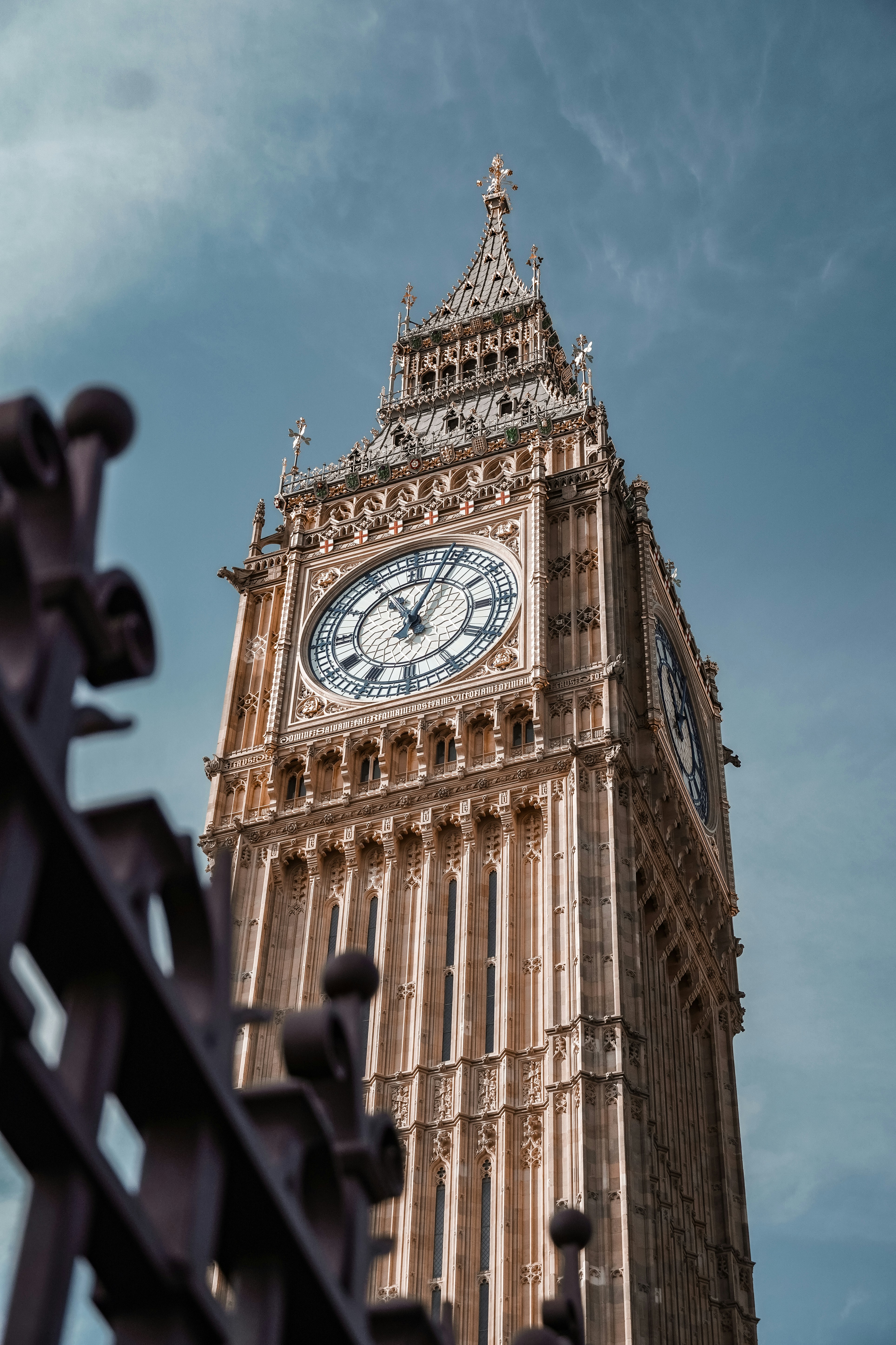 Big ben stands tall against a cloudy sky. photo – Free Travel Image on ...