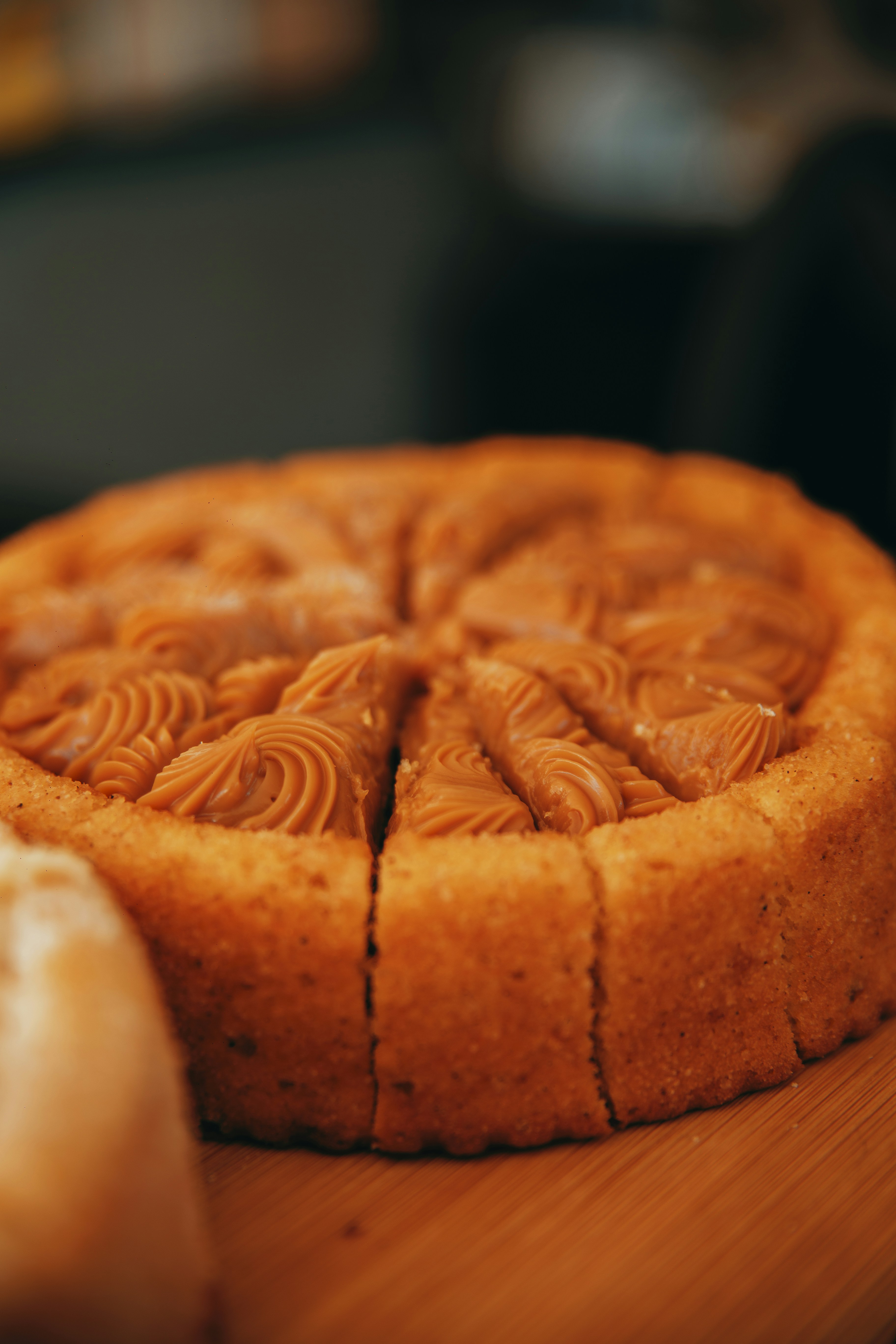 Concentric Caramel Buttercream Cake on a Rustic Board