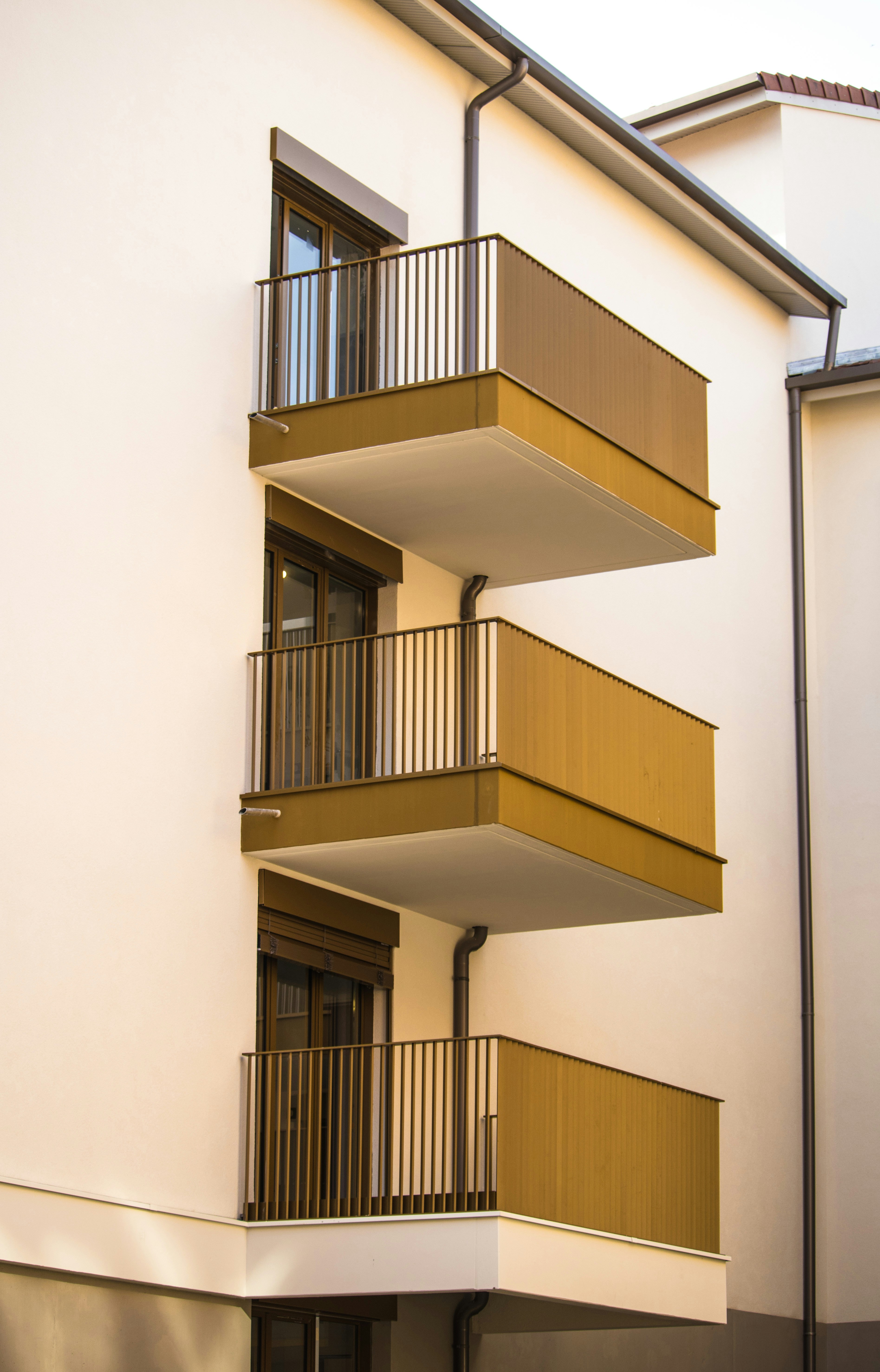 Three modern balconies on a building's facade. photo – Free Building ...