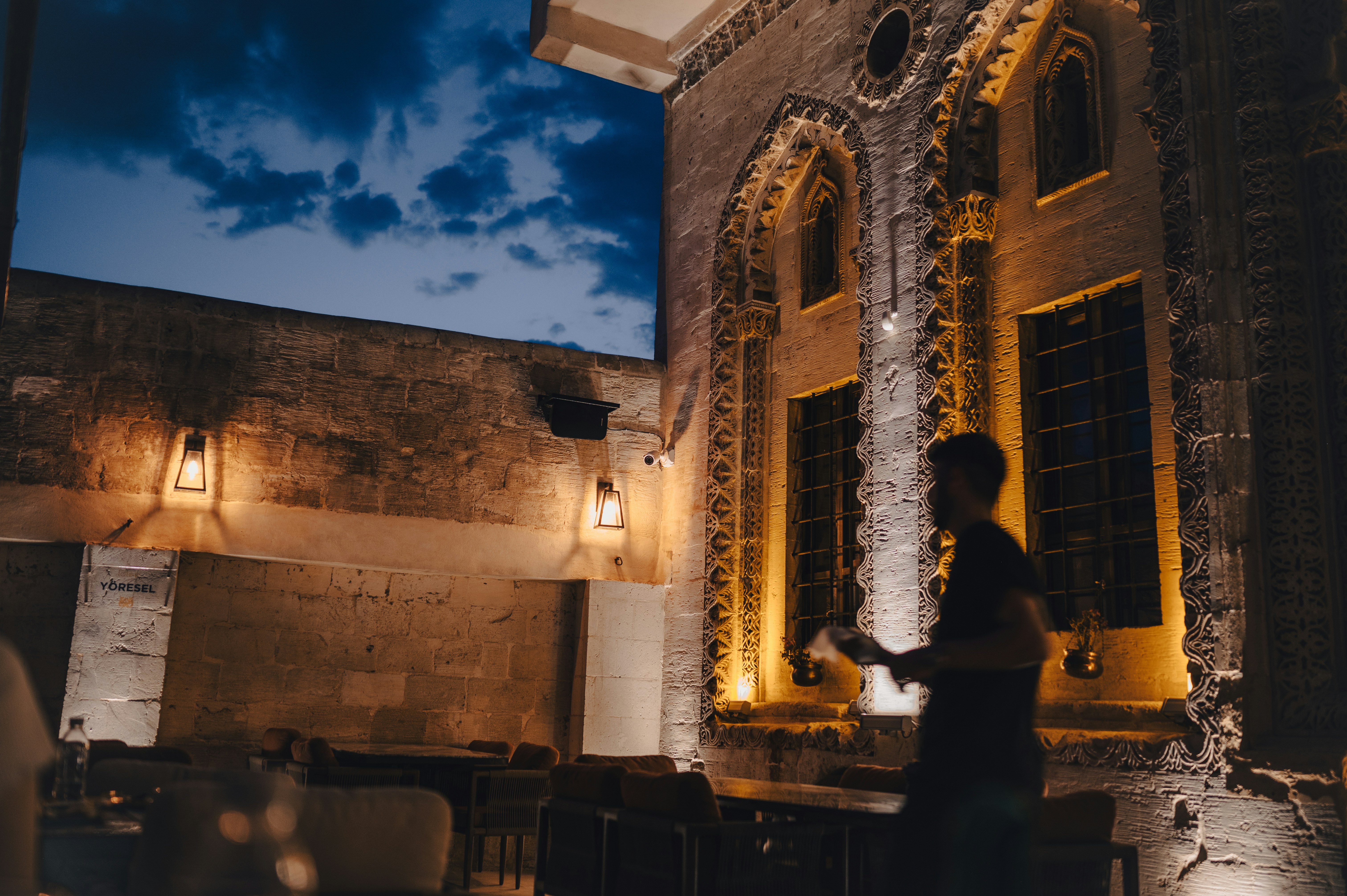 MARDİN CITY | Night scene inside an old stone building.