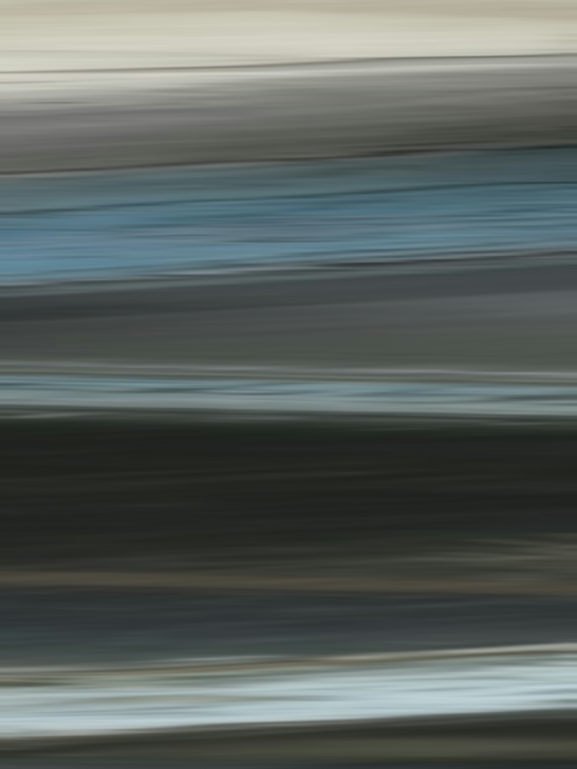 Horizontal lines of various colors create abstract art.