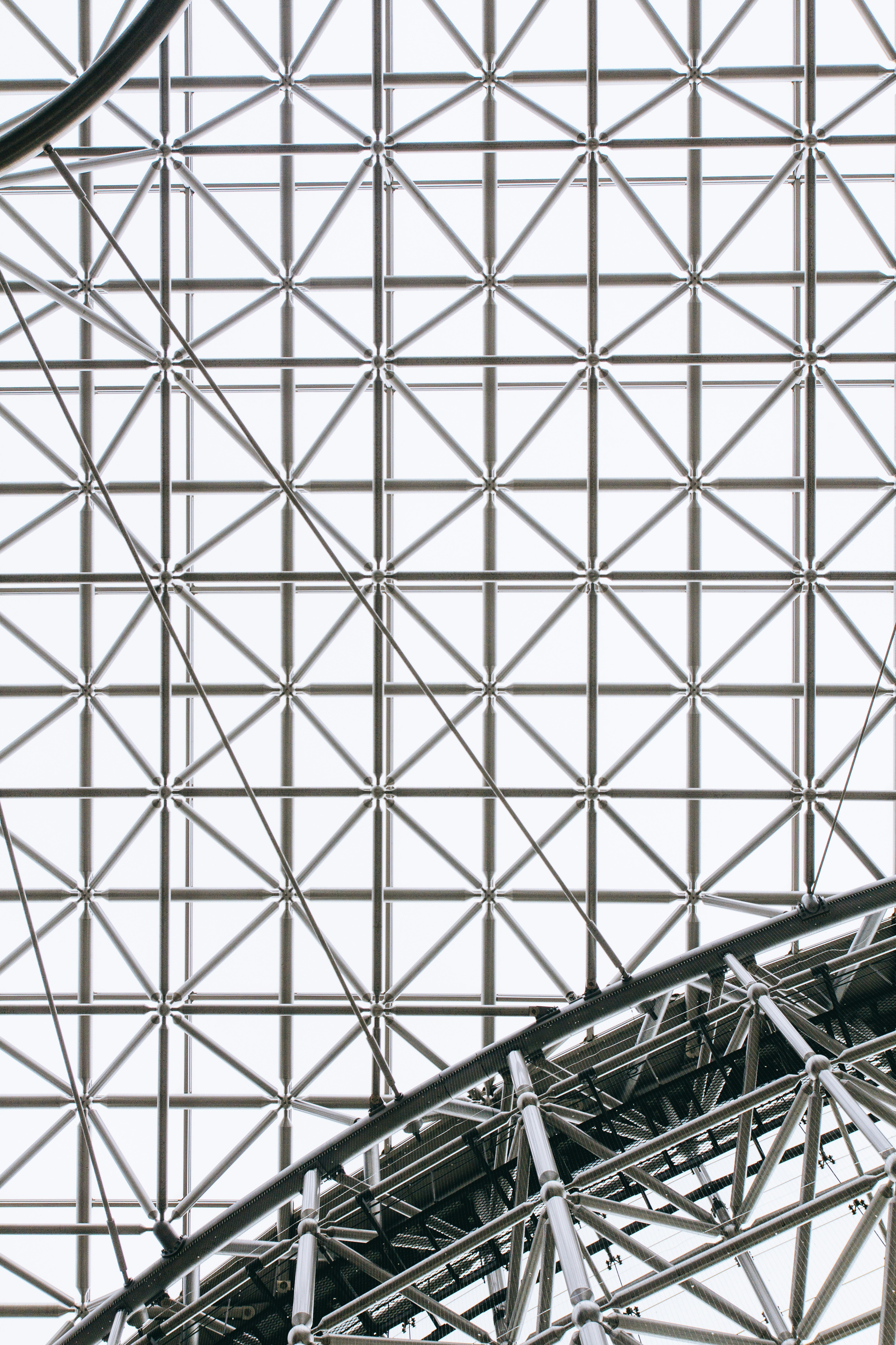 A grid-like structure is visible, overhead. photo – Free City Image on ...