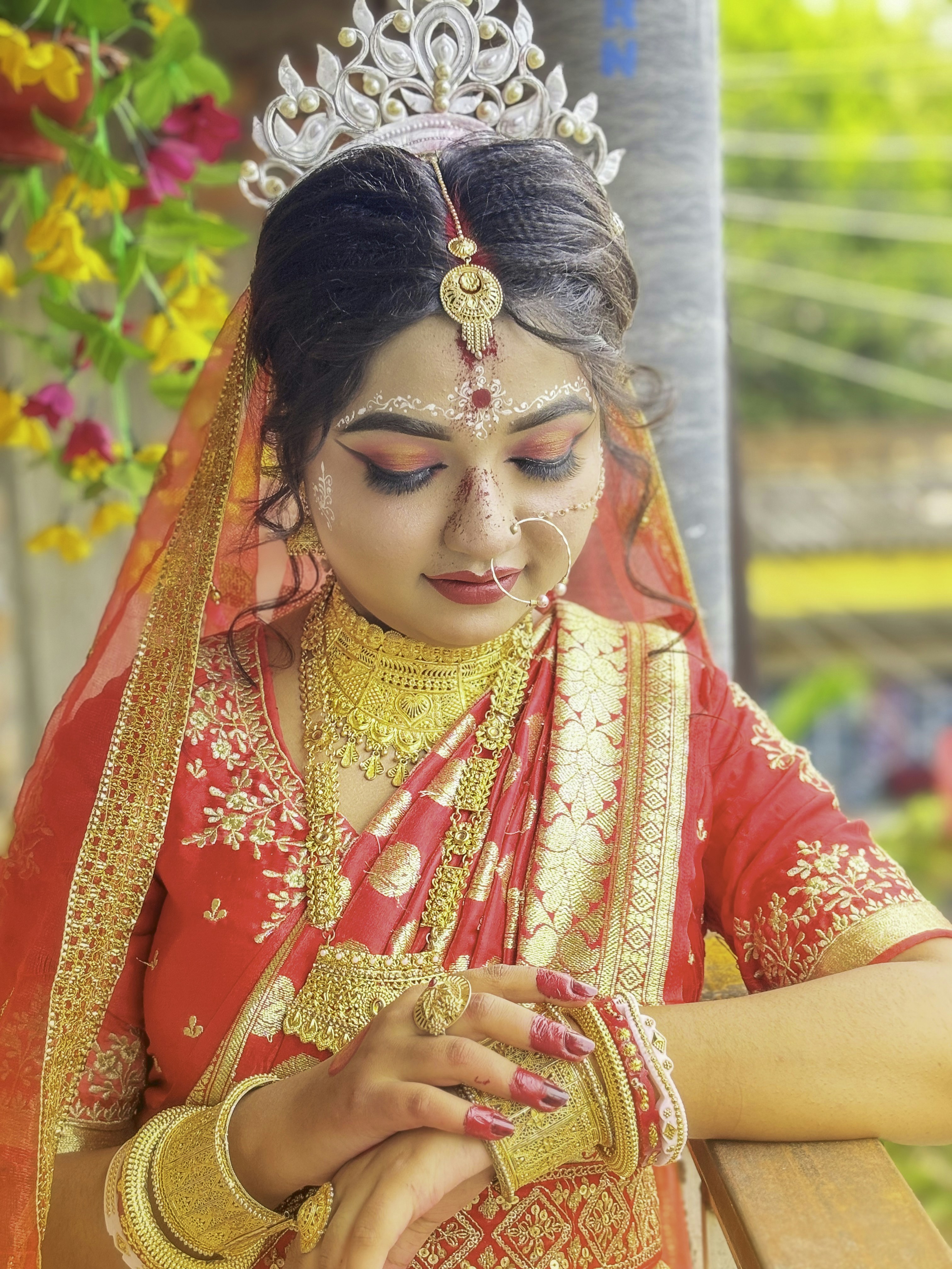 A bengali bride, adorned in traditional wedding attire. photo – Free ...