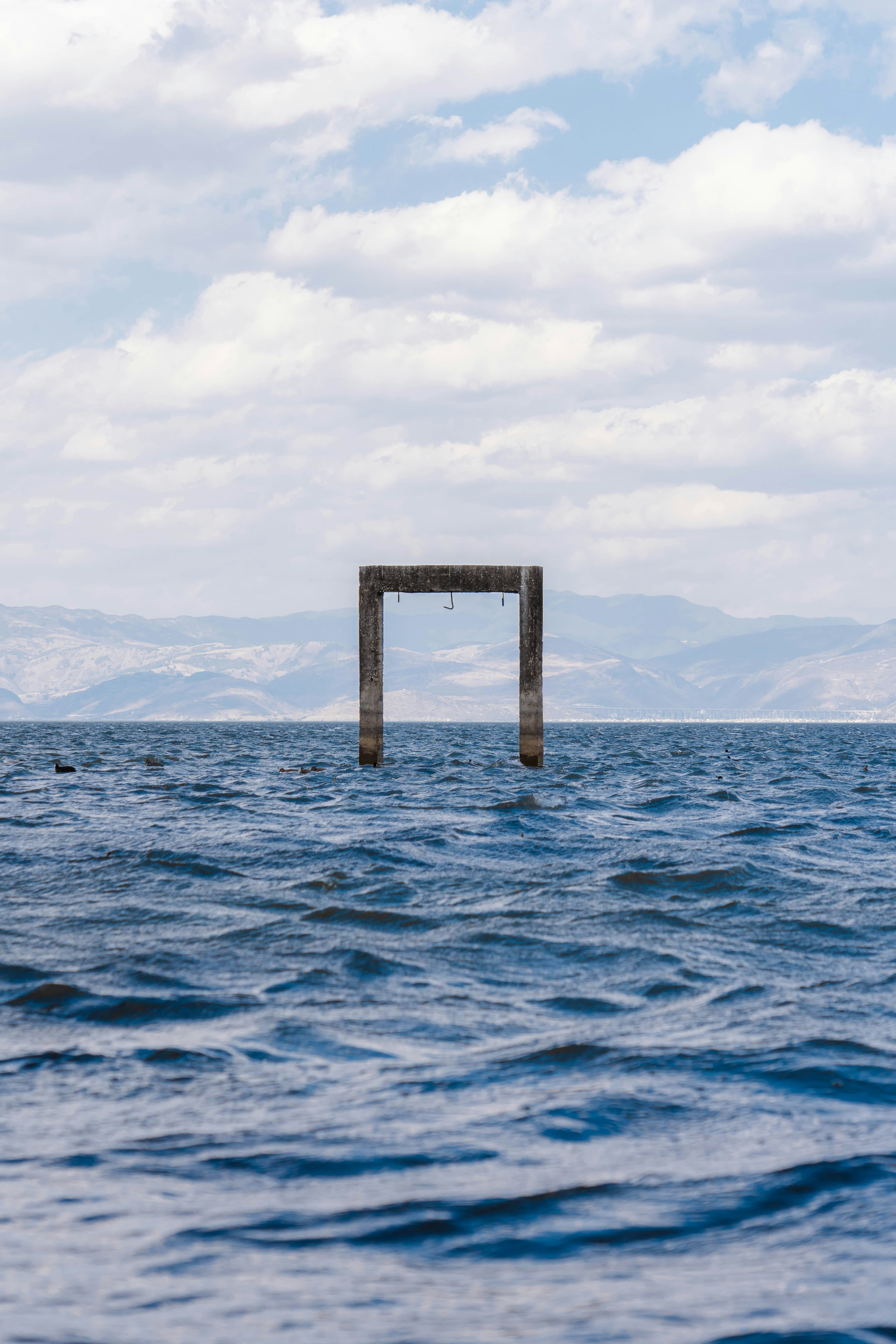 Sea Gate: a solitary frame rising from the blue expanse
