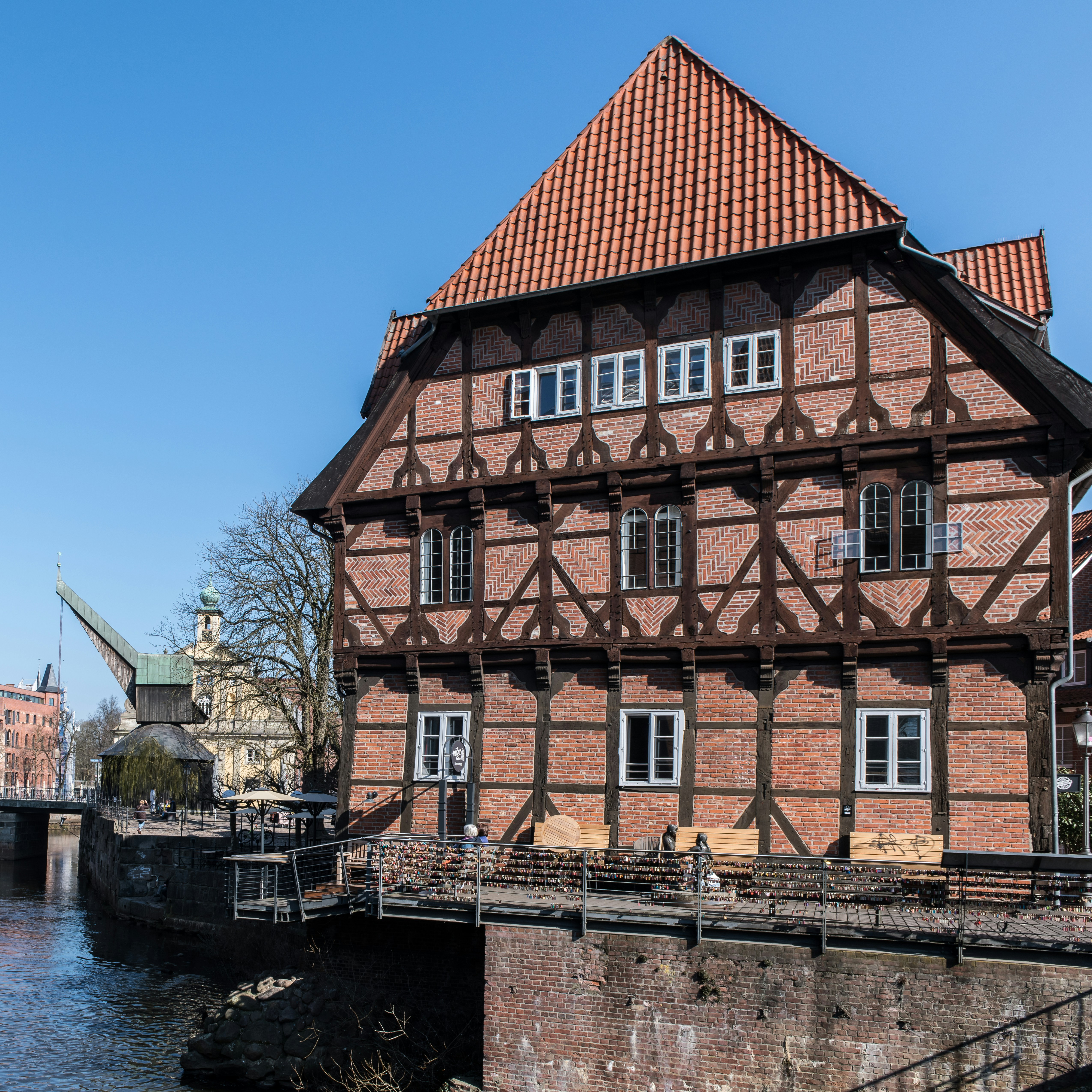 A beautiful timber-framed building on the water. photo – Free Building ...