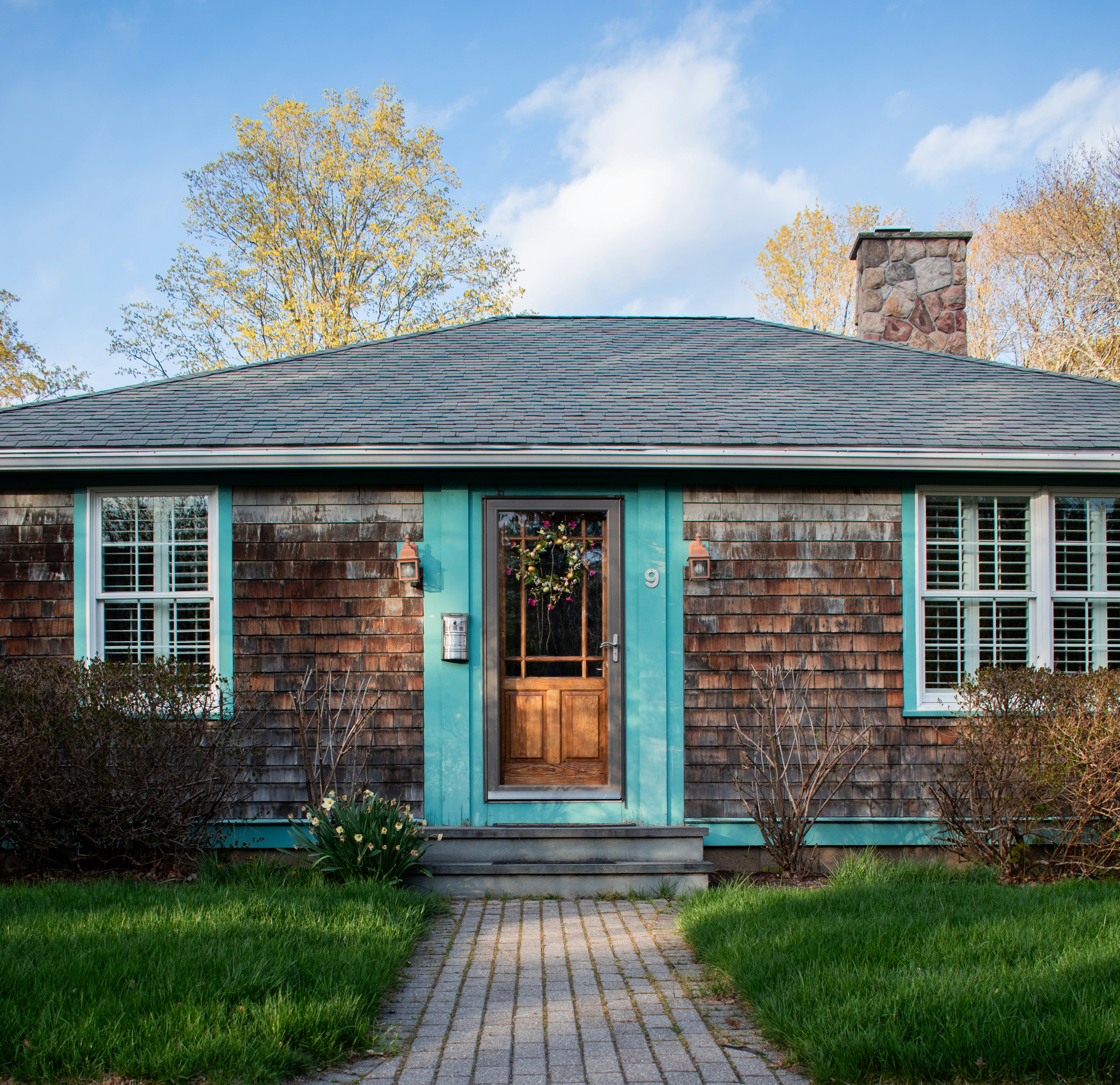 Teal-Trim Threshold: Symmetry and Cedar Shingle Charm of a Suburban Cottage