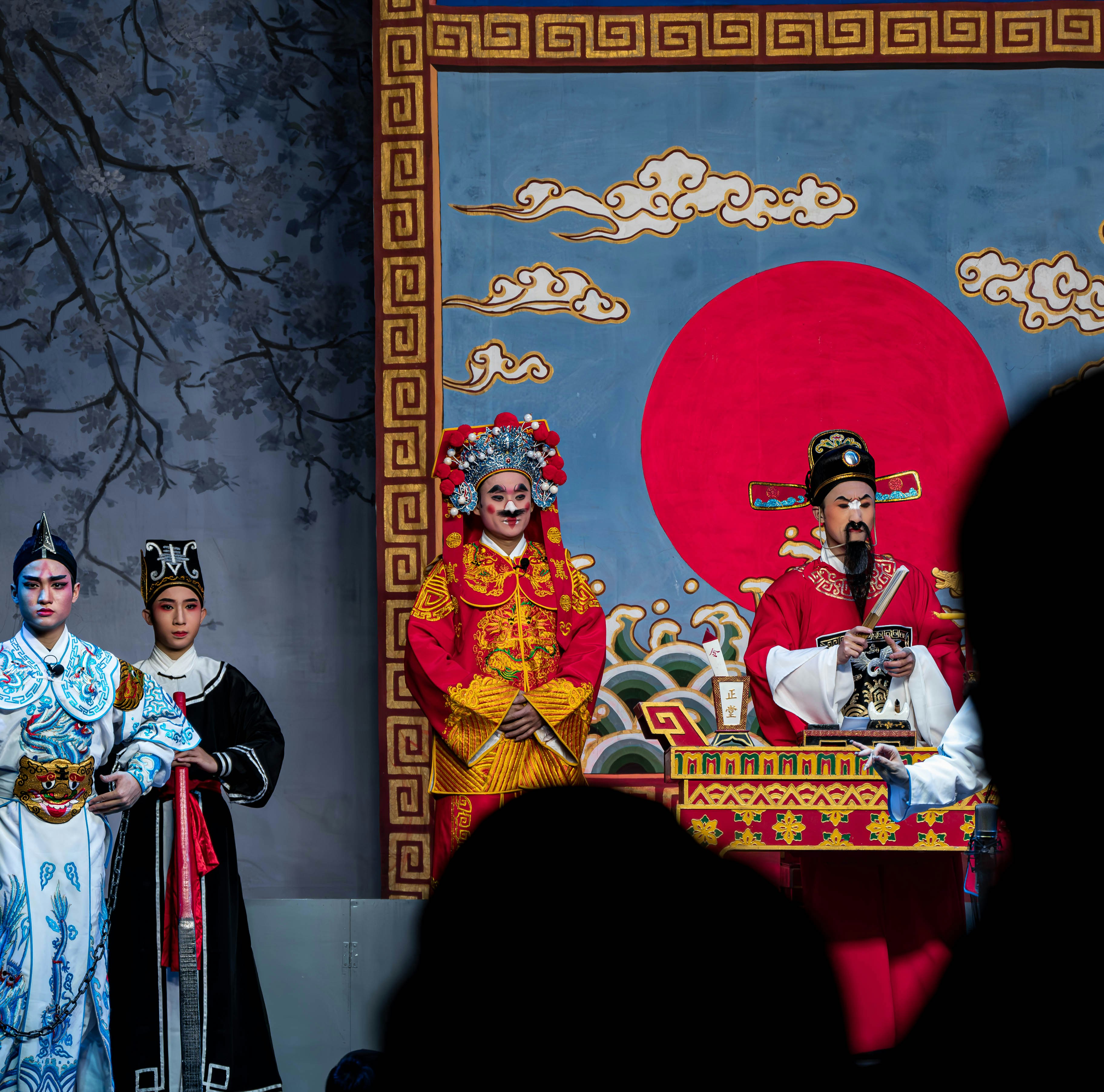 Actors perform a colorful scene on a stage. photo – Free Travel Image ...