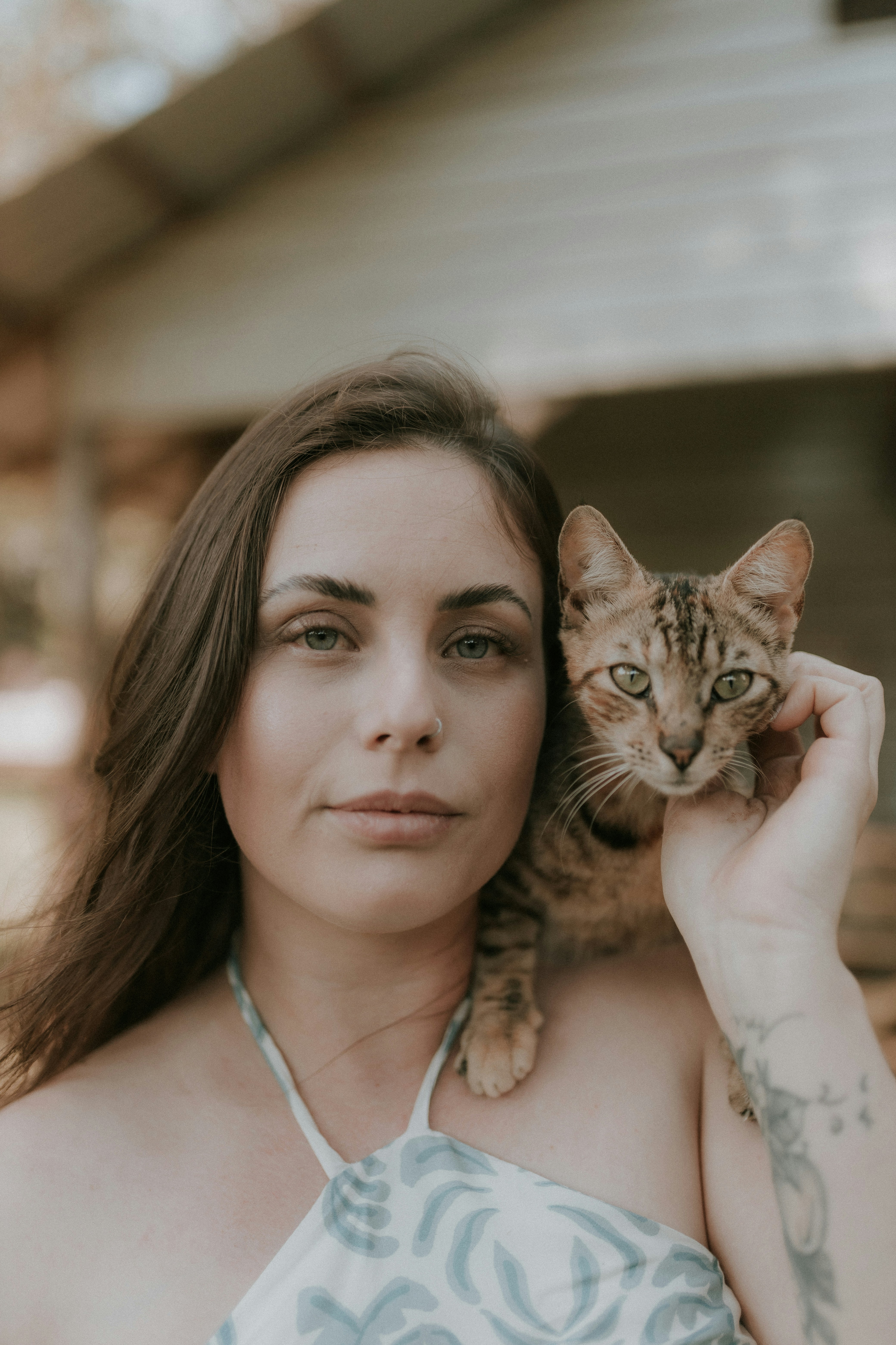 Portrait with Cat: Quiet Confidence in Soft Light