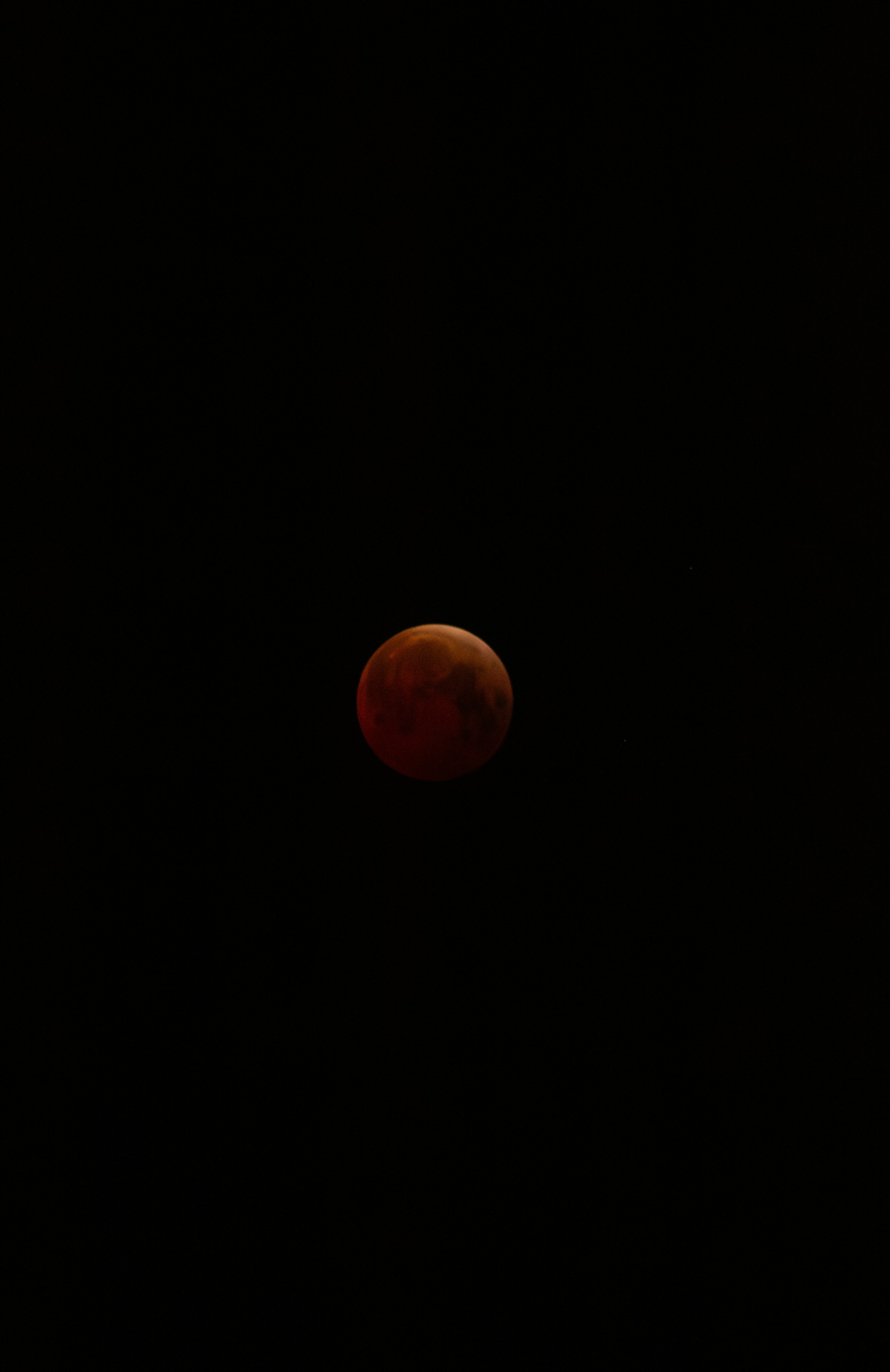Lunar Eclipse Over Quebec's Night Sky
