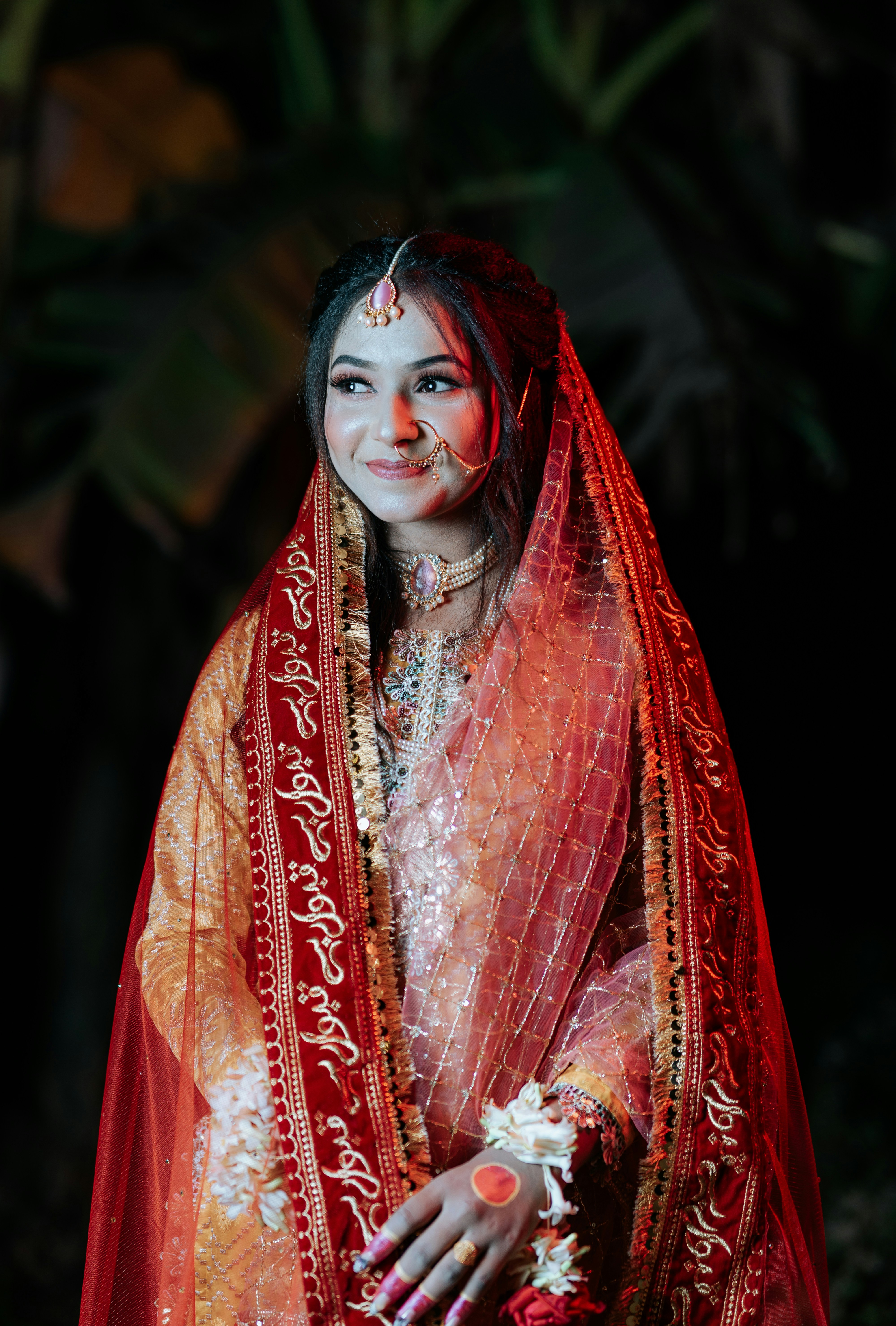 A beautiful bride smiles in her traditional attire. photo – Free ...