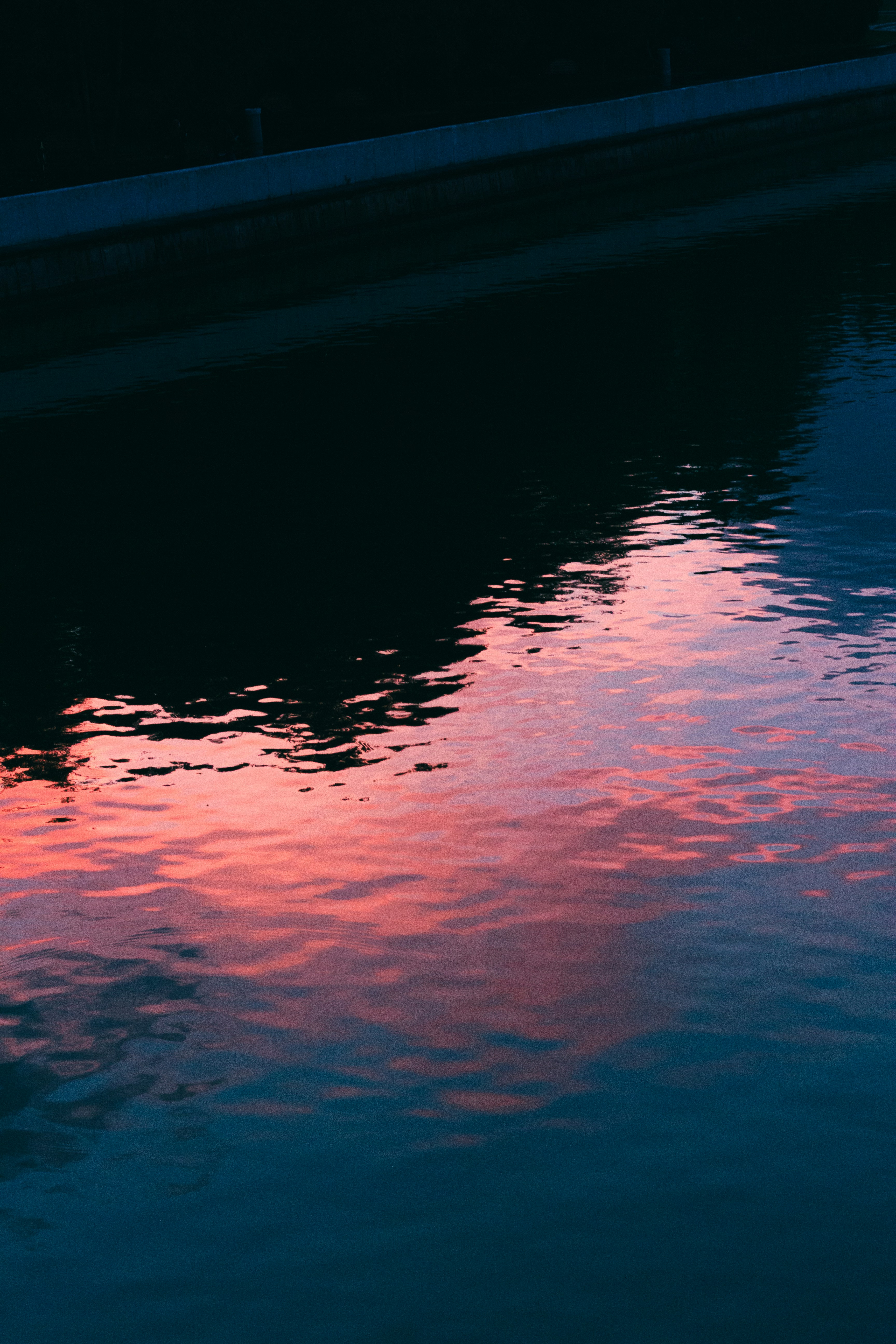 Reflection of sunset colors in the water. photo – Free Abstract Image ...