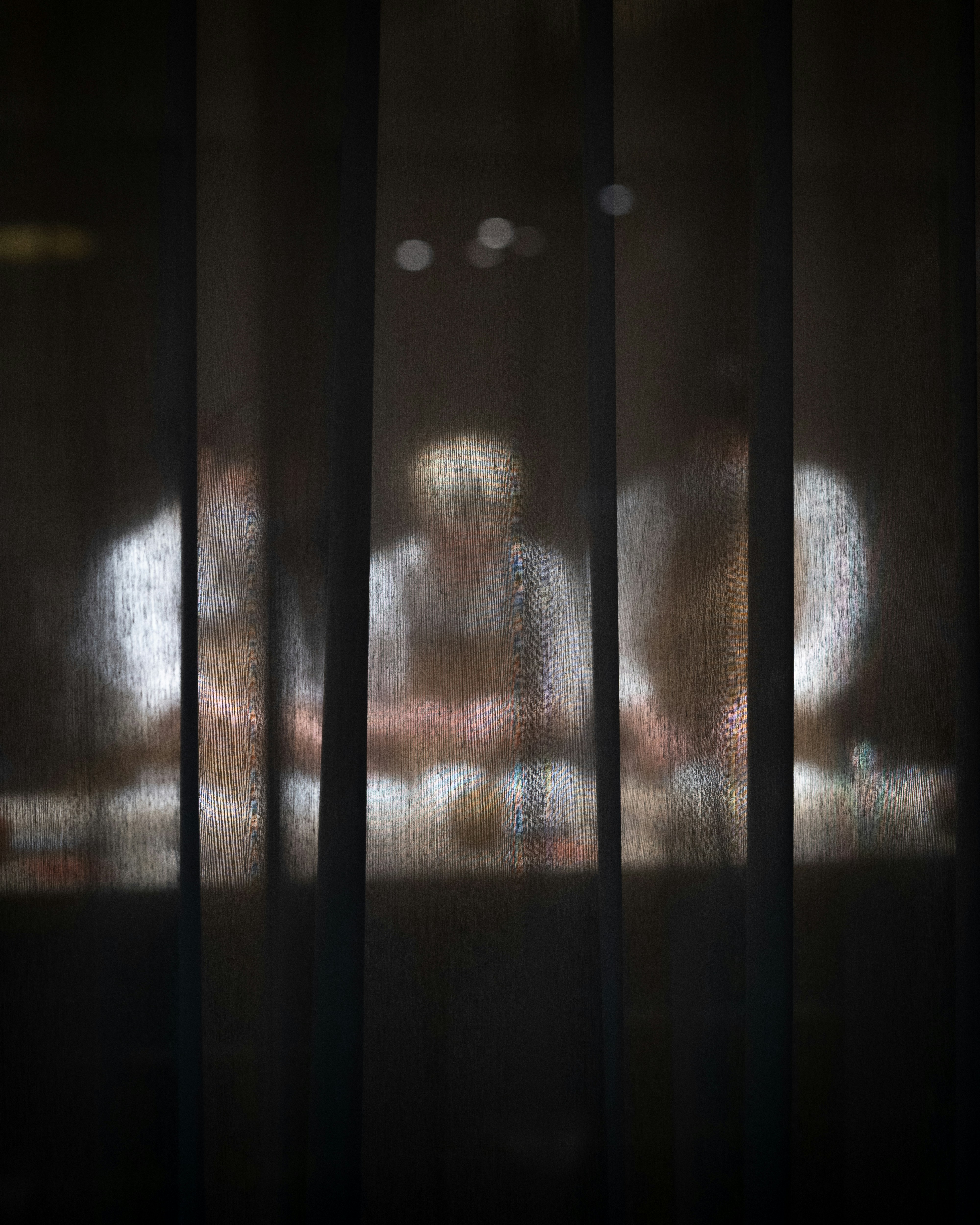 People appear behind curtains with soft lighting. photo – Free Face ...